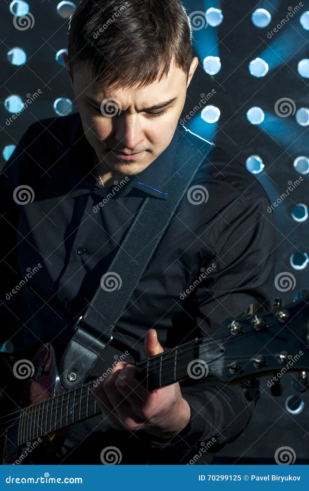 Portrait of Young Man Playing on Guitar on Stage Stock Image - Image of ...