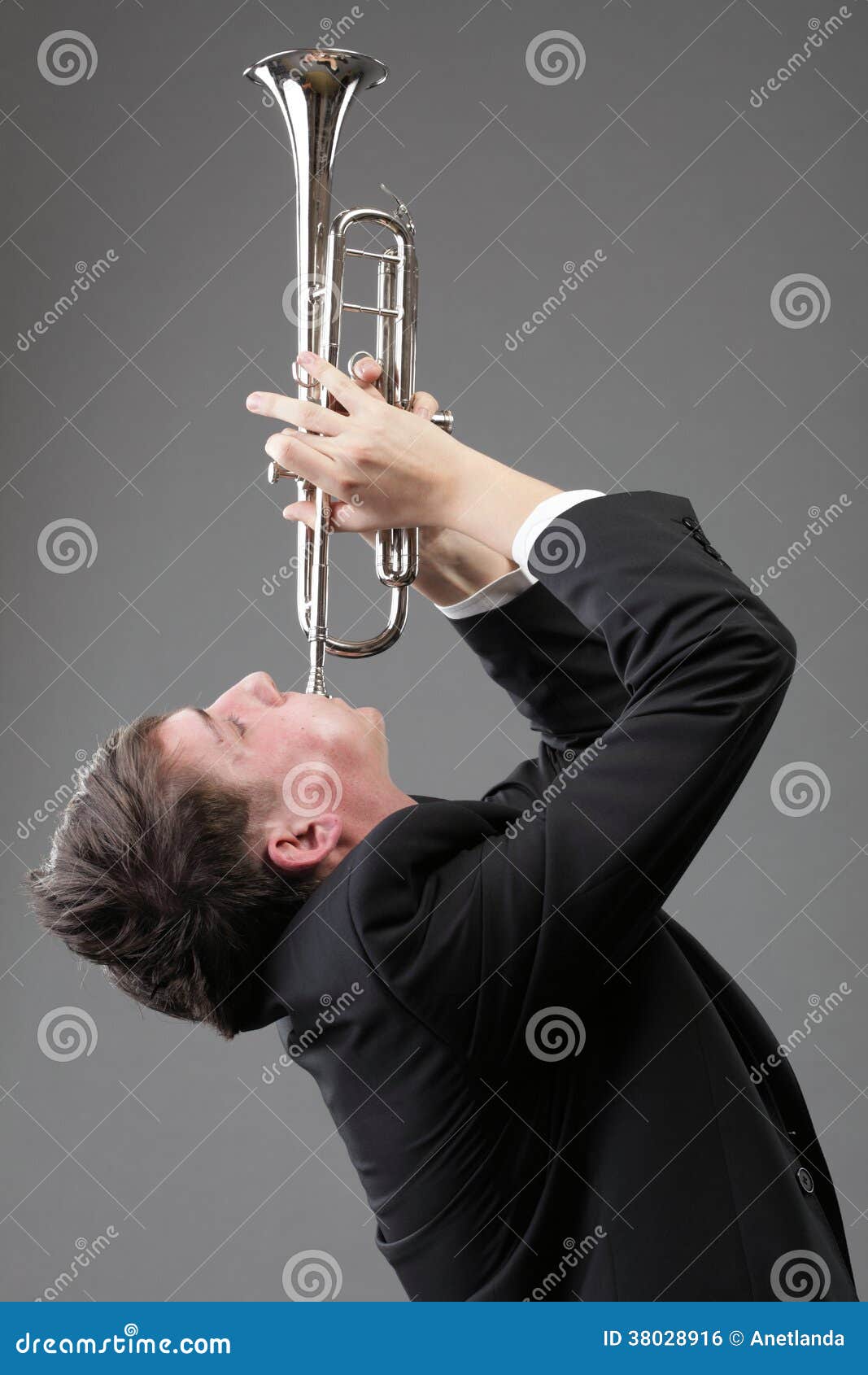 Portrait of a Young Man Playing His Trumpet Stock Photo - Image of ...