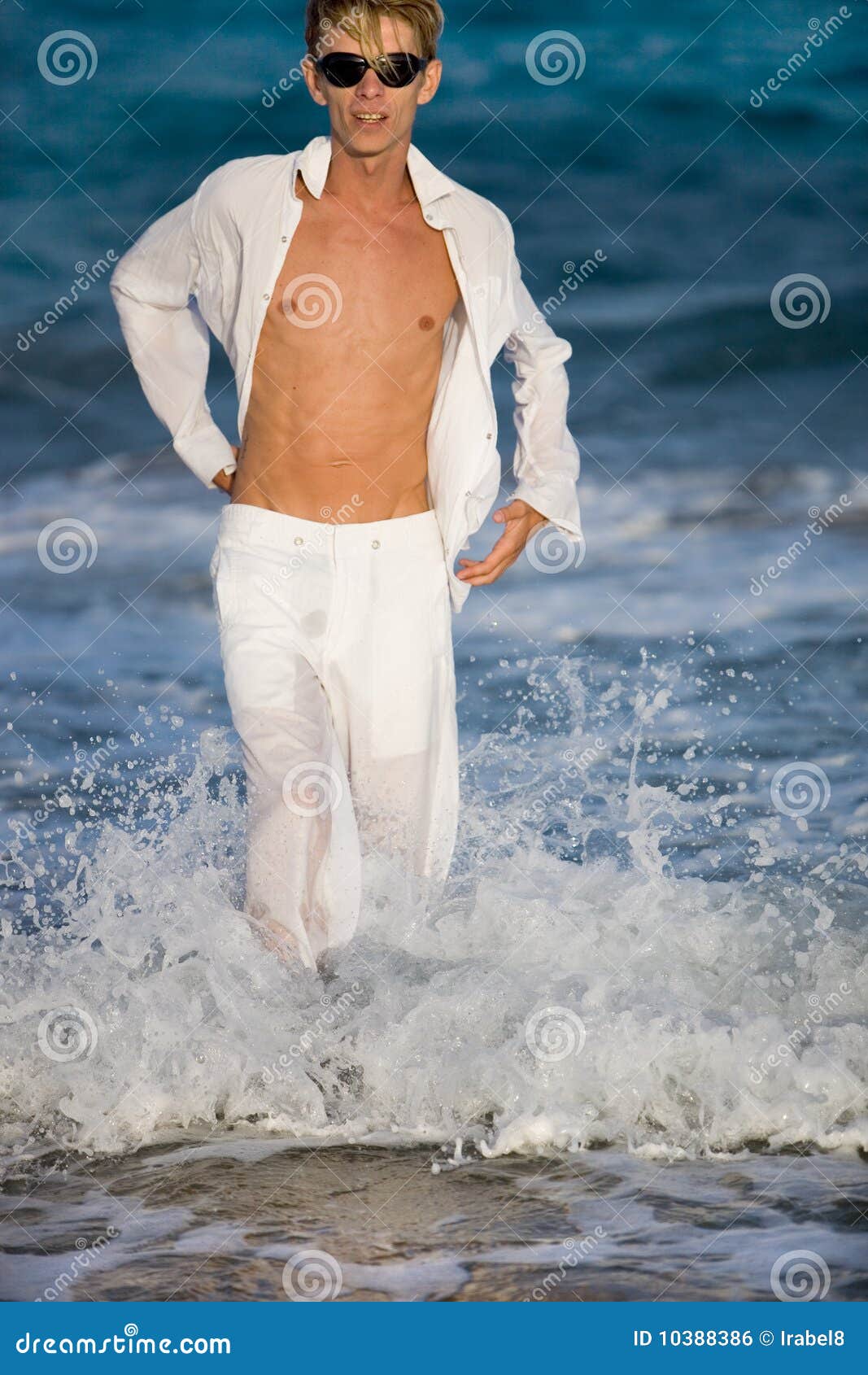 Portrait of Young Man Posing at the Sea Shore Stock Photo - Image of ...