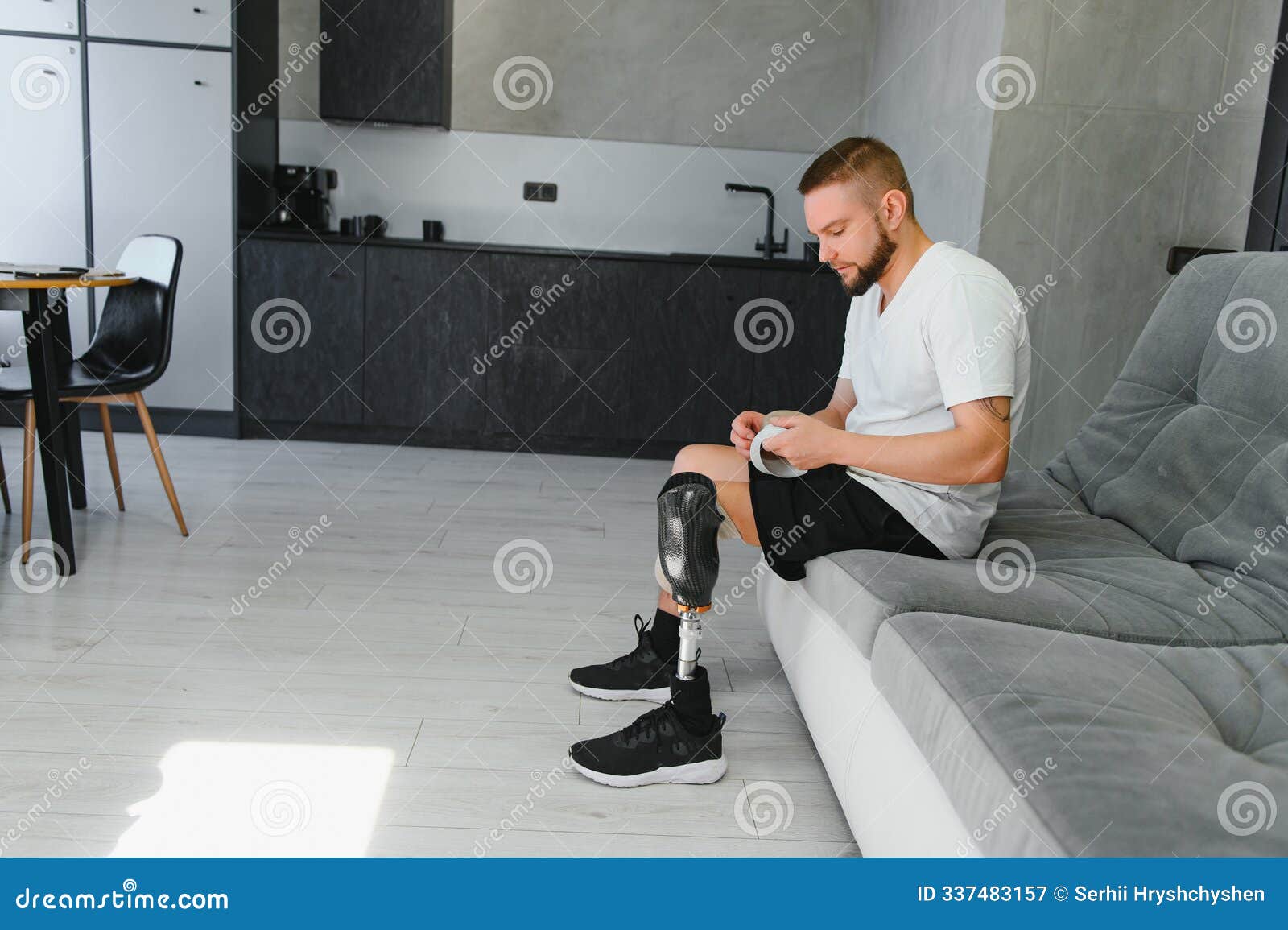 Portrait of a Young Man with a Prosthetic Leg at Home Stock Image ...