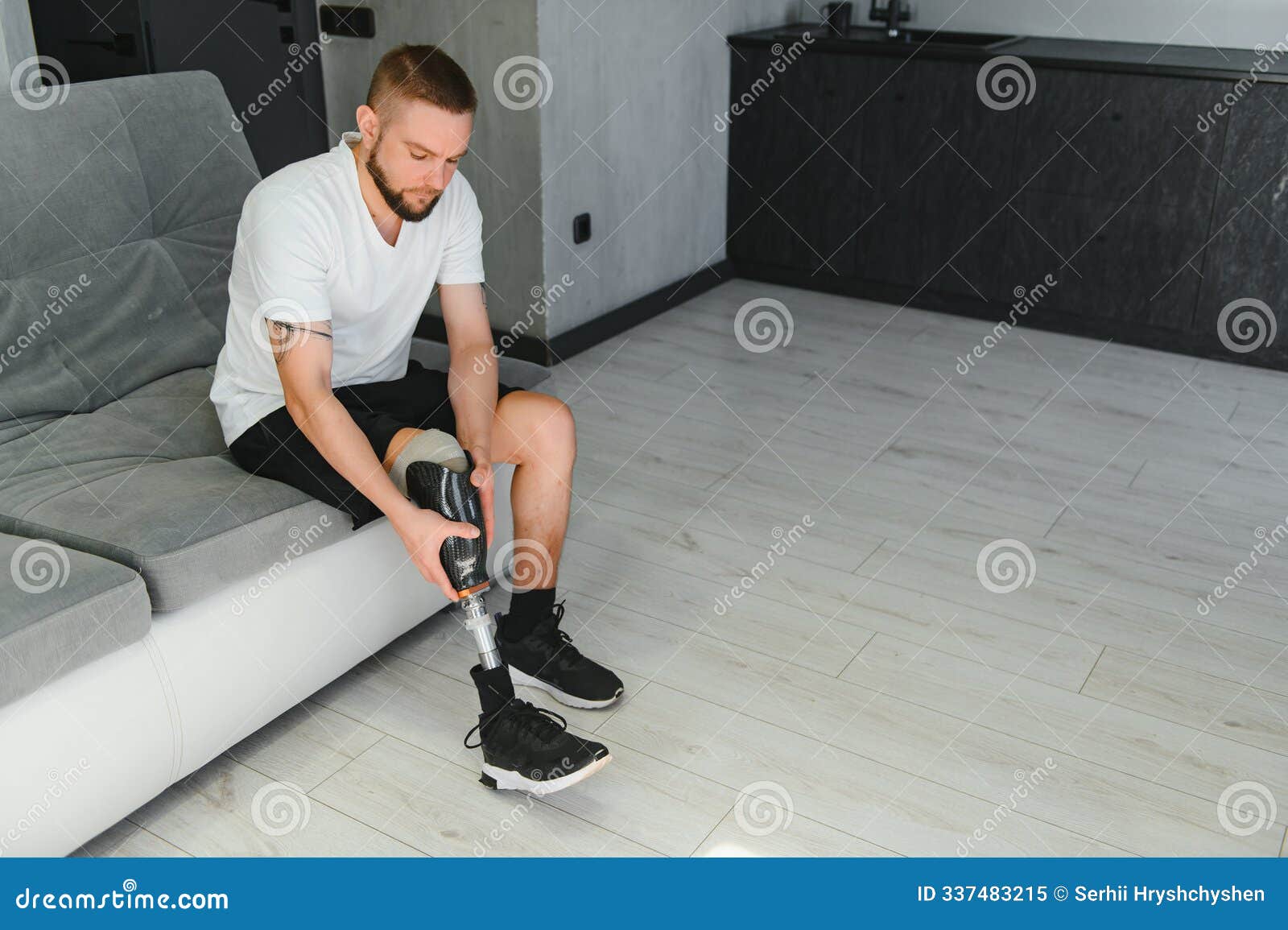 Portrait of a Young Man with a Prosthetic Leg at Home Stock Image ...