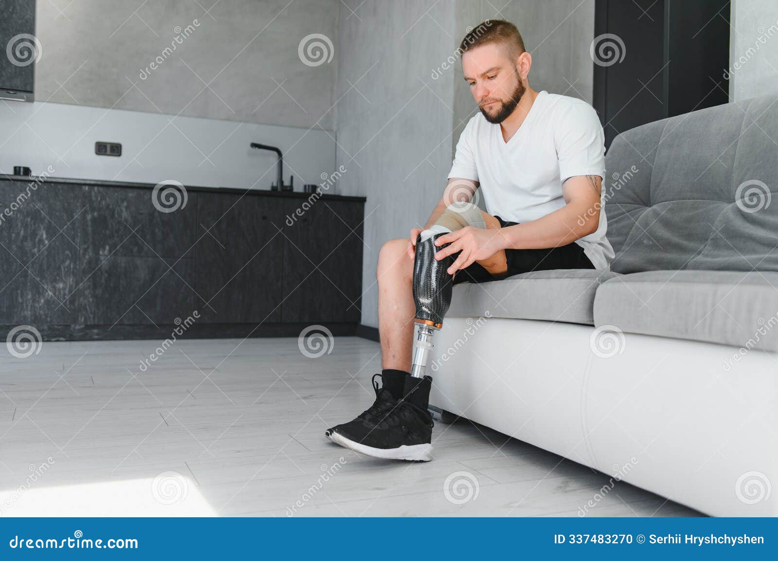 Portrait of a Young Man with a Prosthetic Leg at Home Stock Photo ...