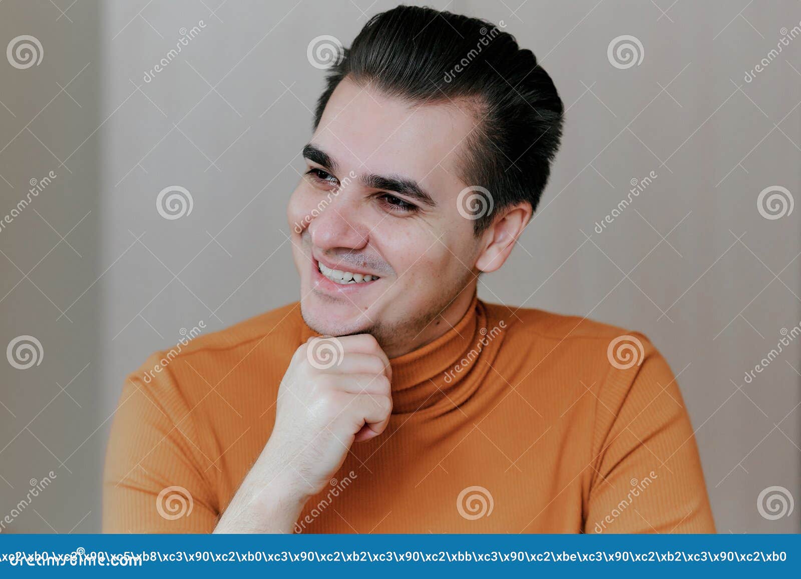 Portrait of a Young Man. the Man Puts His Hands Under His Chin and ...