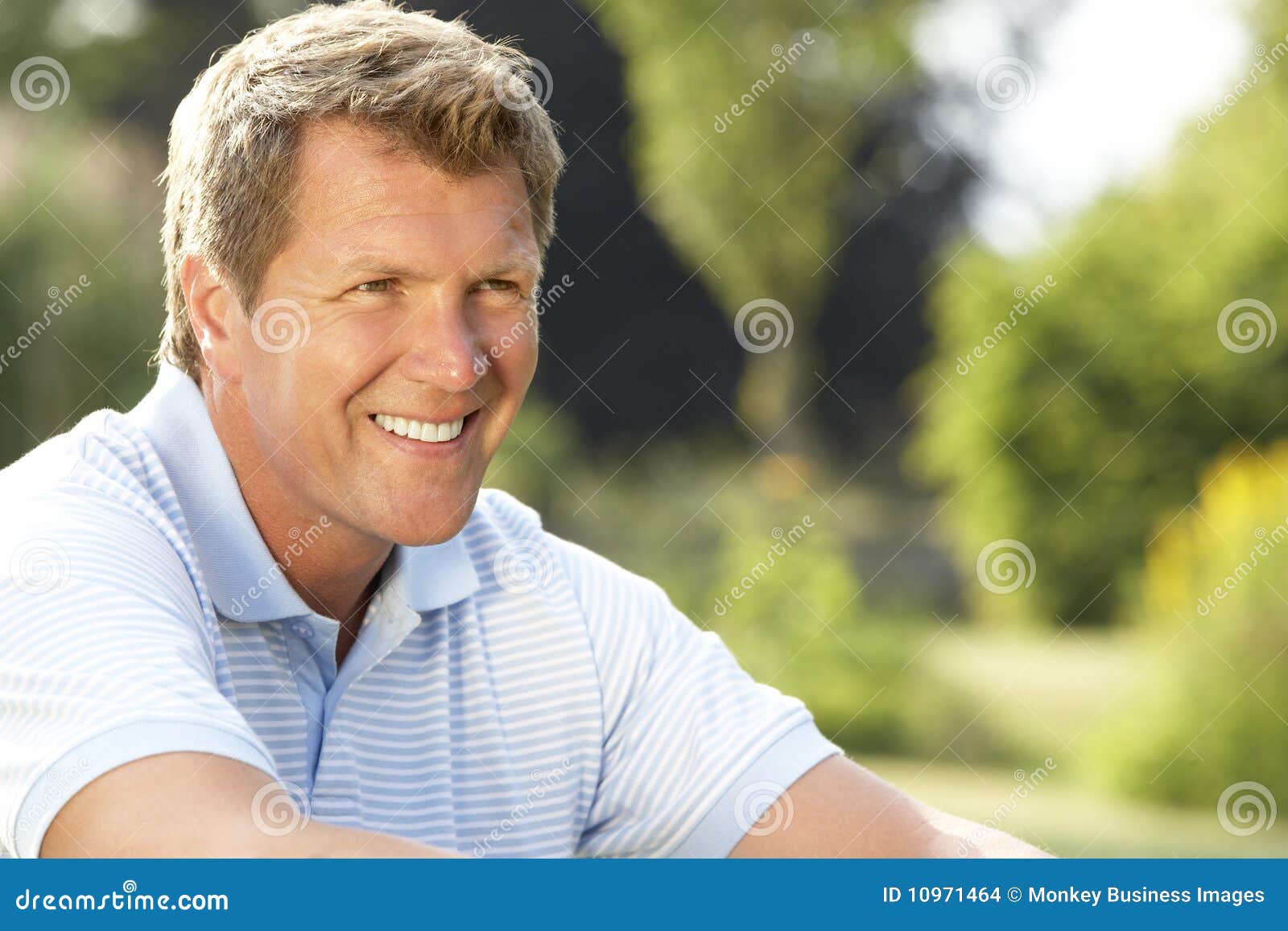 Portrait of Young Man Relaxing in Countryside Stock Photo - Image of ...