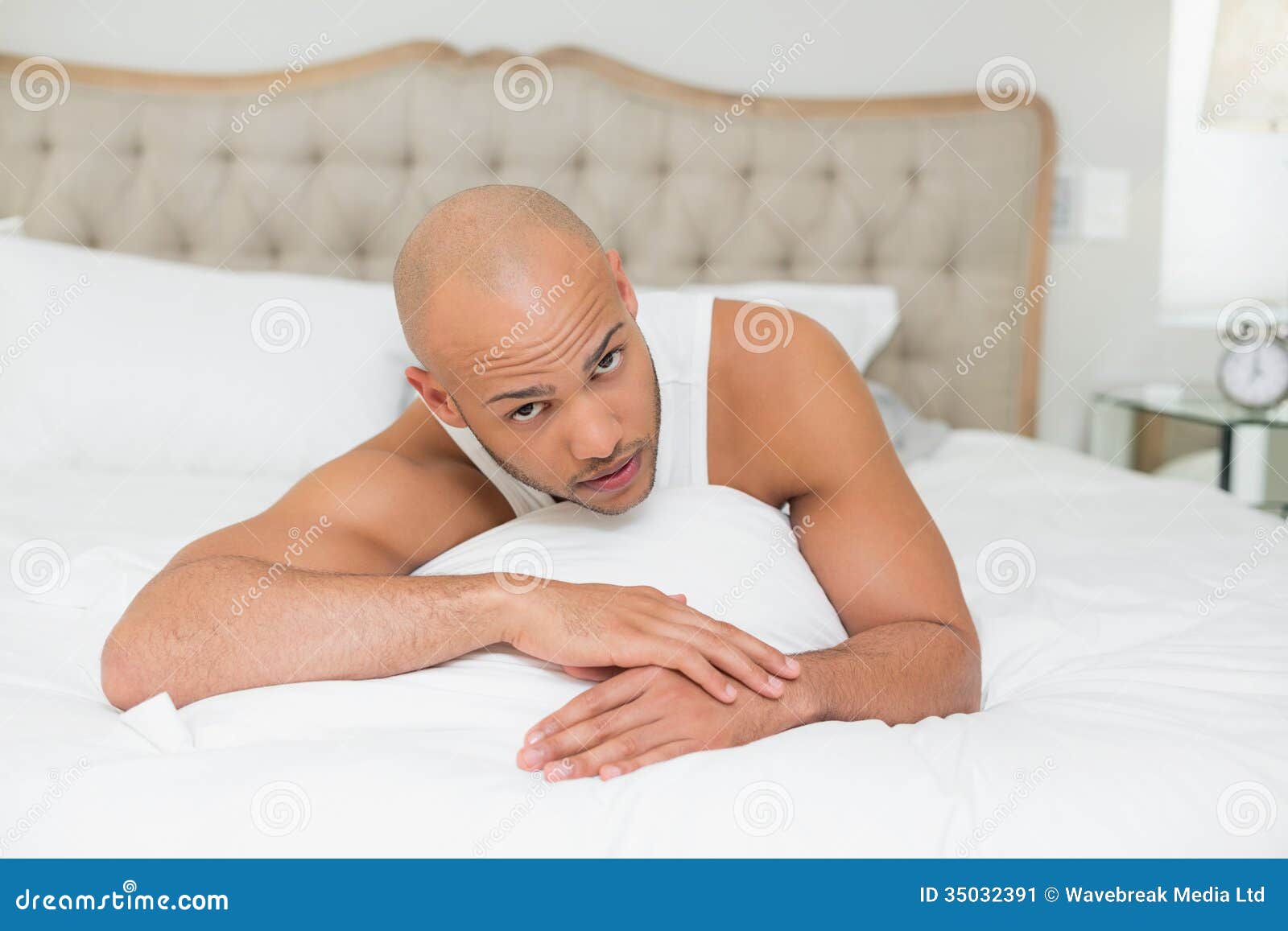 Portrait of a Young Man Resting in Bed Stock Image - Image of domestic ...