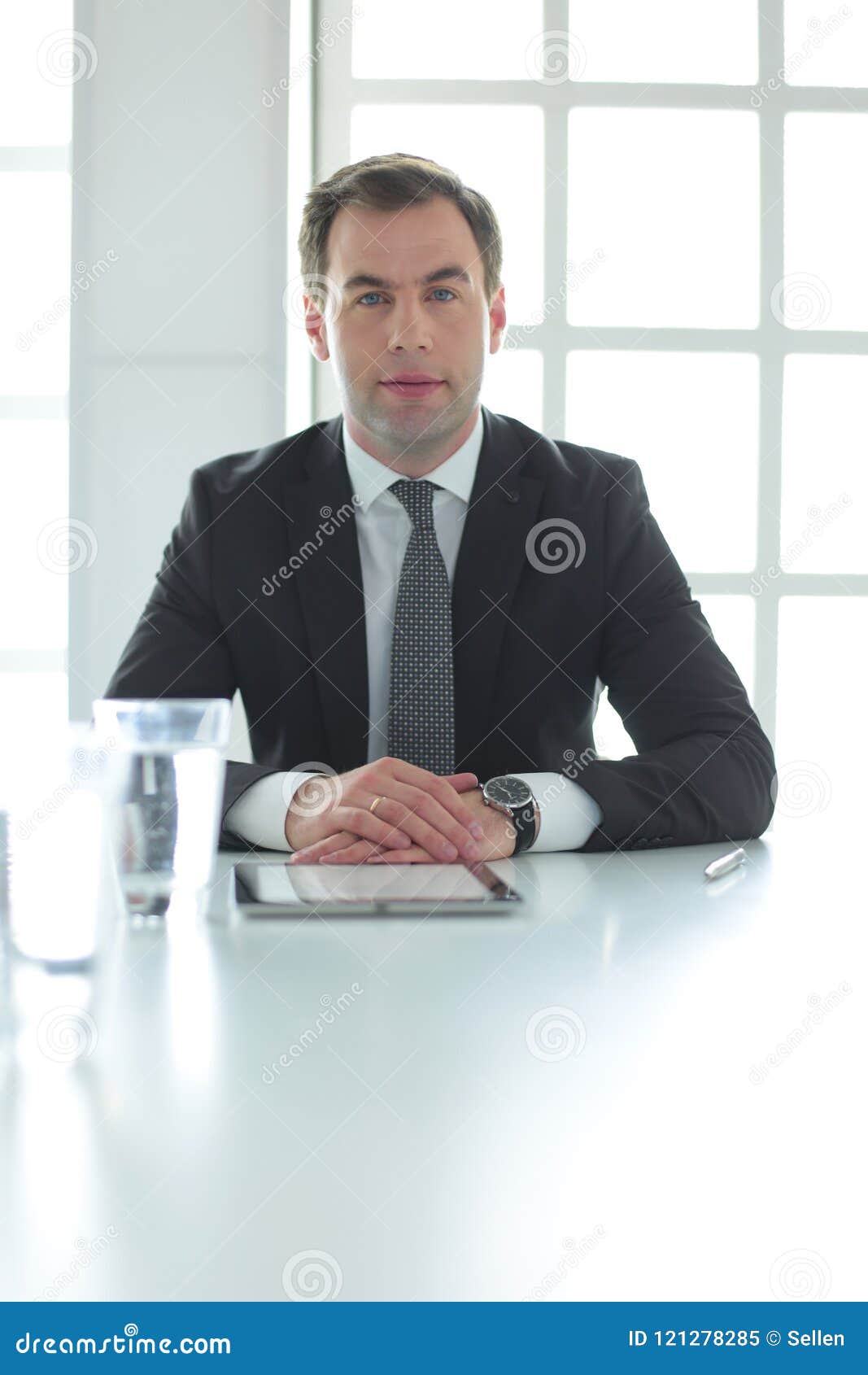 Portrait of Young Man Sitting at His Desk in the Office. Stock Image ...