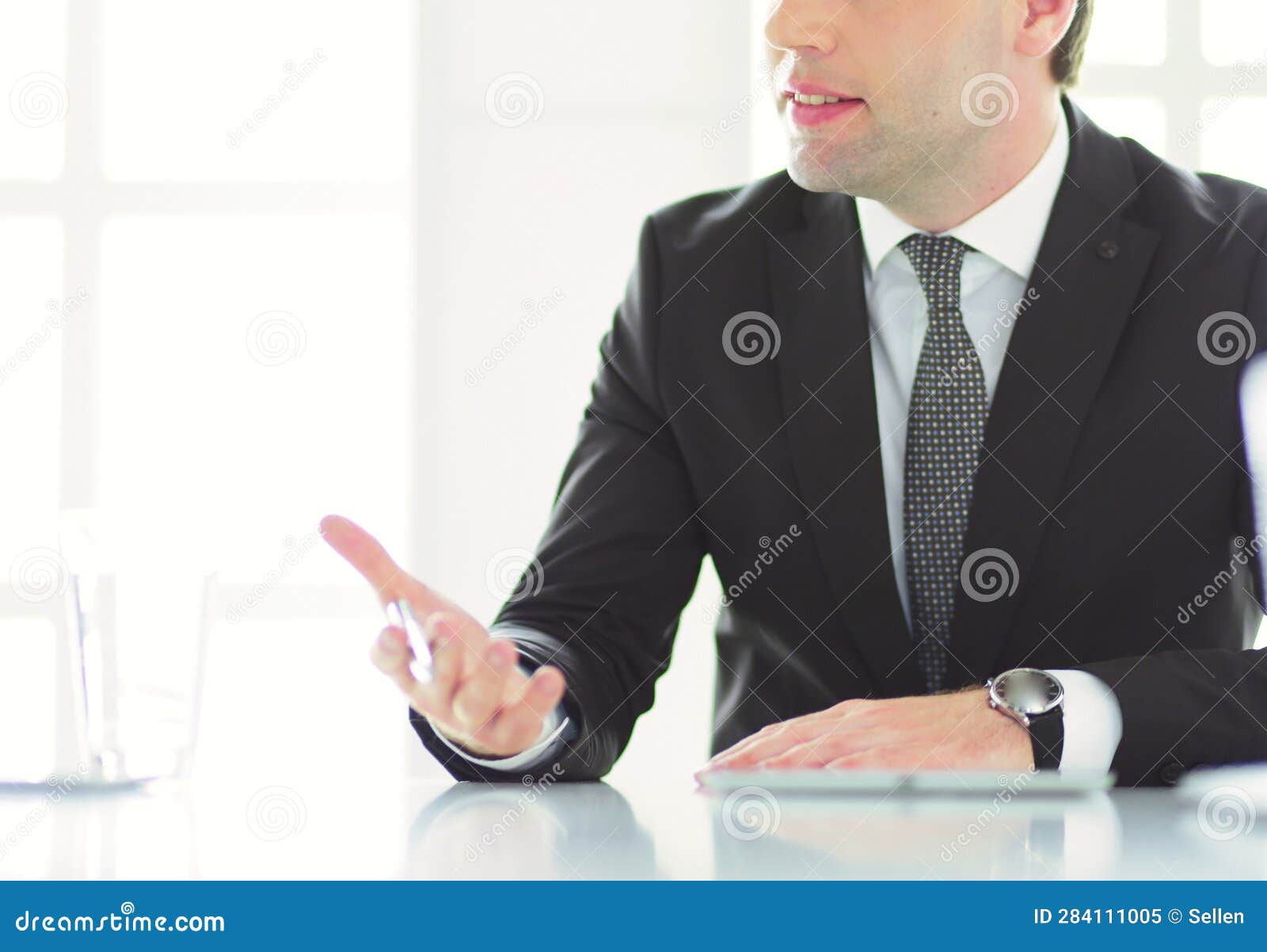 Portrait of Young Man Sitting at His Desk in the Office. Stock Image ...