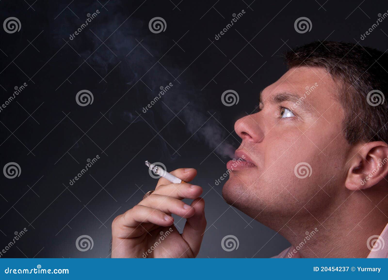 A Portrait of a Young Man Smoking a Cigarette Stock Image - Image of ...