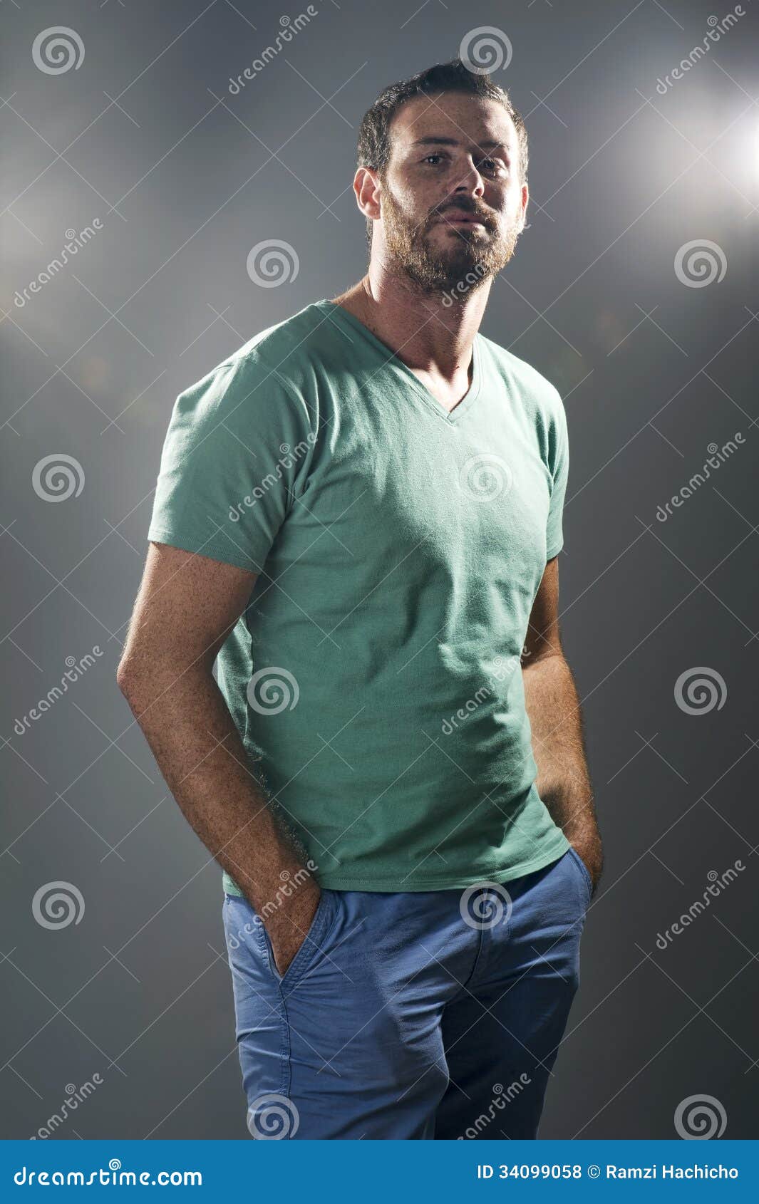 Portrait of a Young Man with Spot Lights Pointing on Him Stock Photo ...
