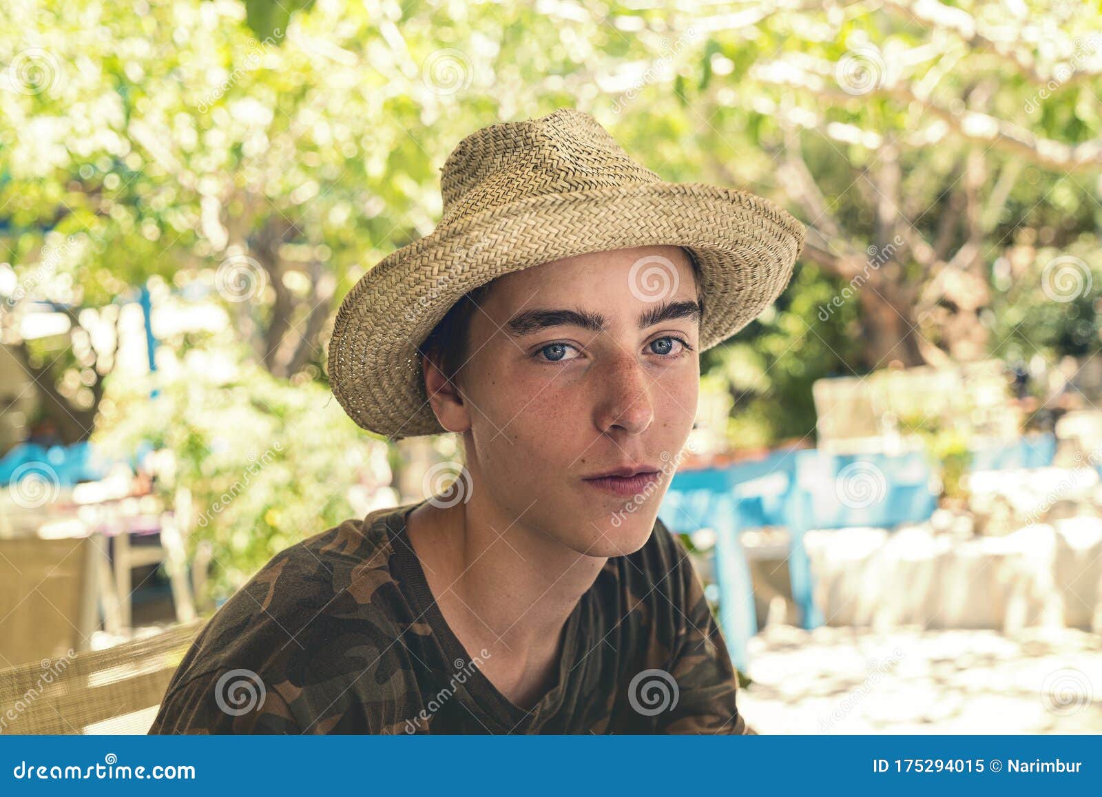 Young Man with Straw Hat in Summer Stock Image - Image of summer, bokeh ...