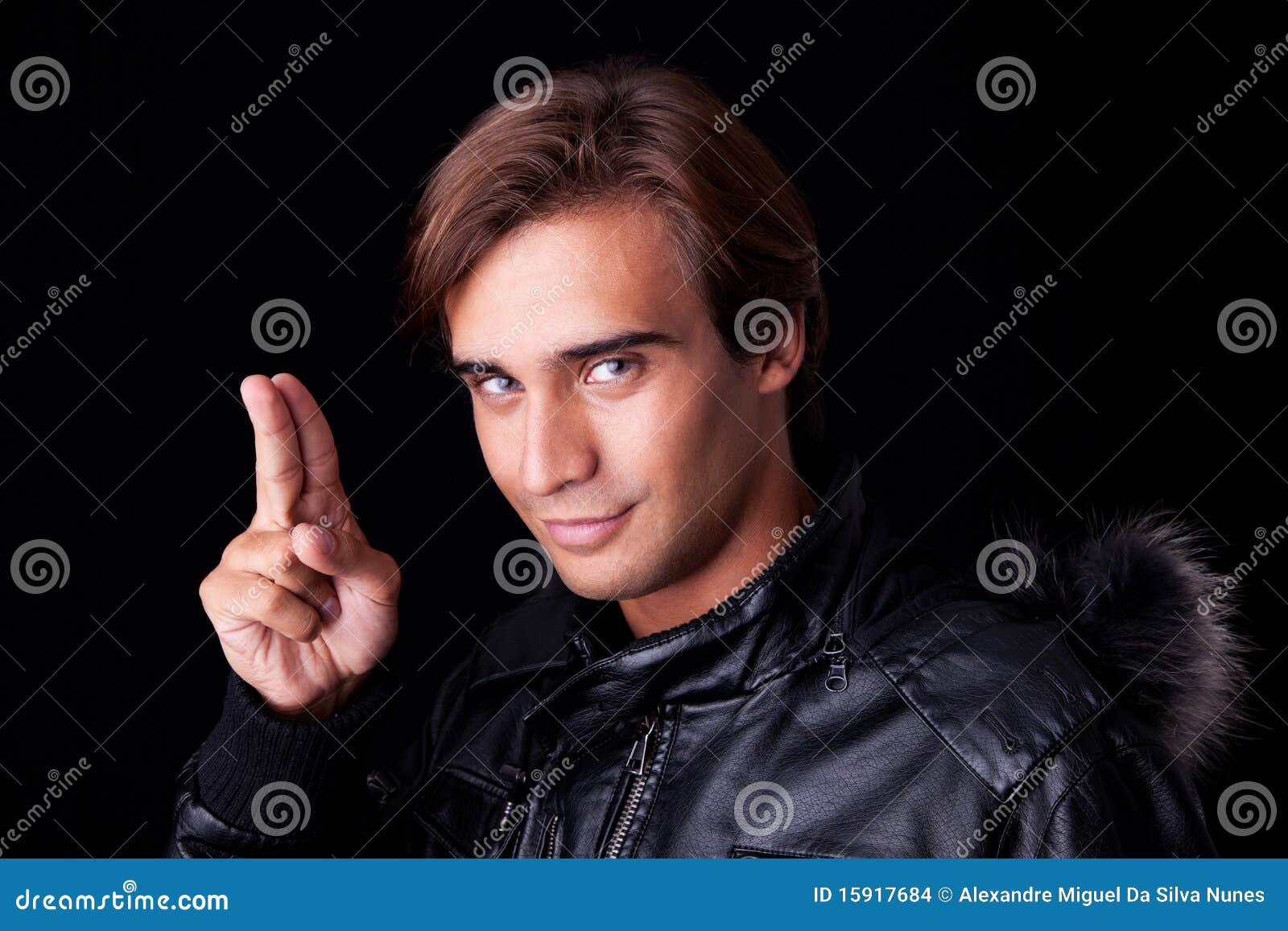 Portrait of a Young Man with Two Fingers Up Stock Photo - Image of ...