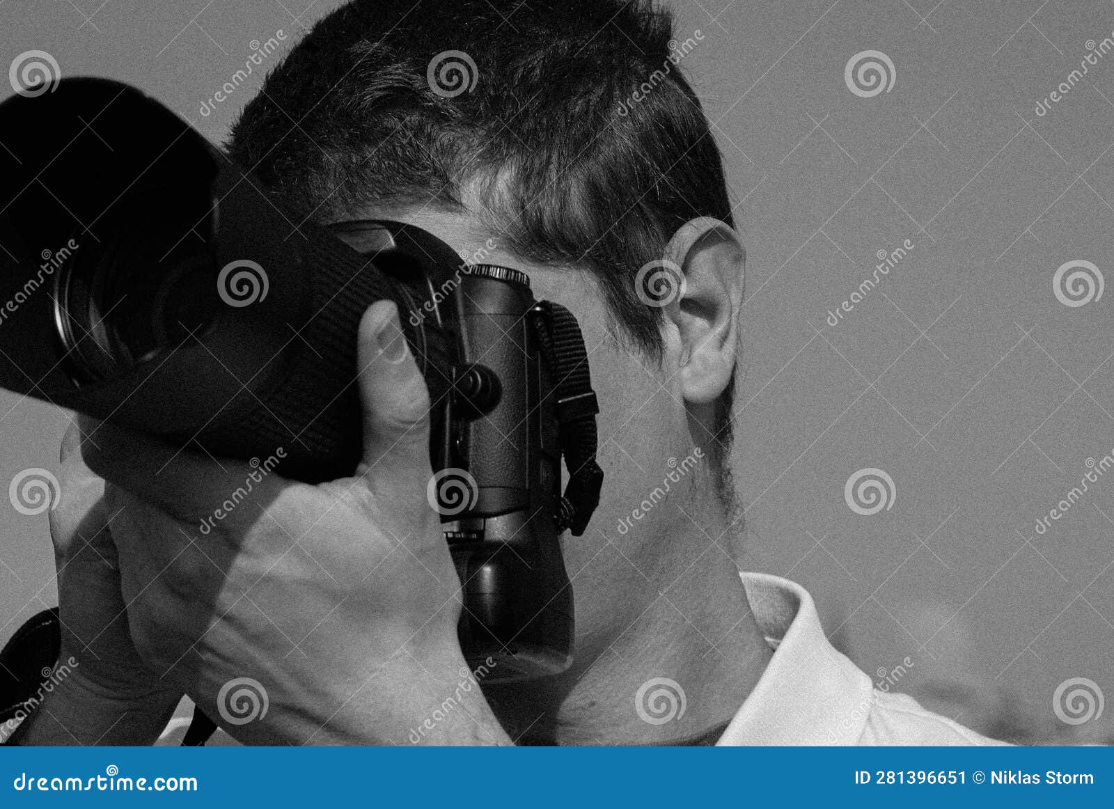 A Portrait of a Young Man Using a Camera Stock Image - Image of zoom ...