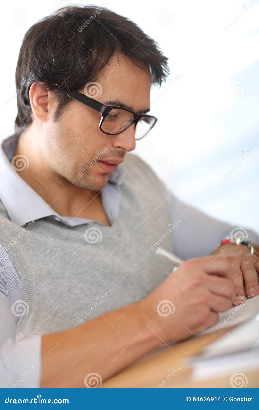 Portrait of Young Man Writing Notes Stock Photo - Image of writing ...