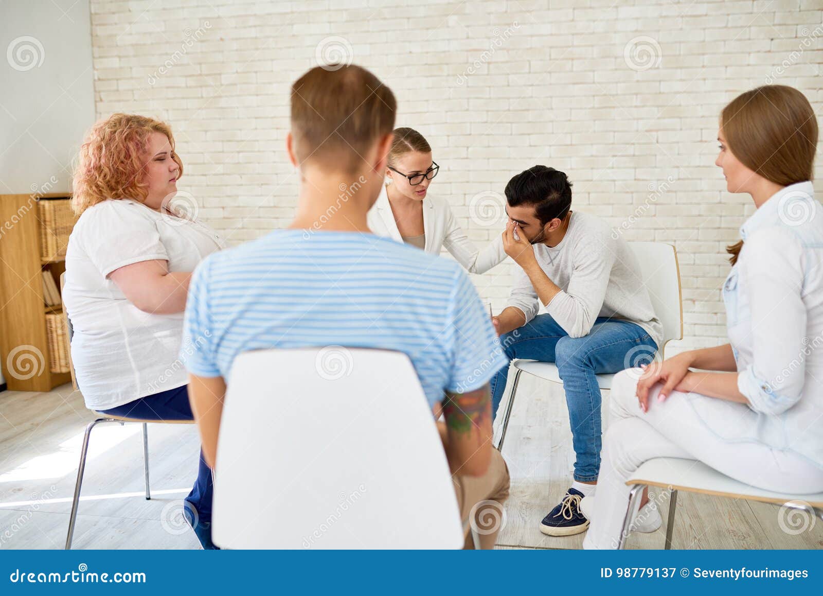 Young Man Sharing Problems in Group Therapy Session Stock Image - Image ...