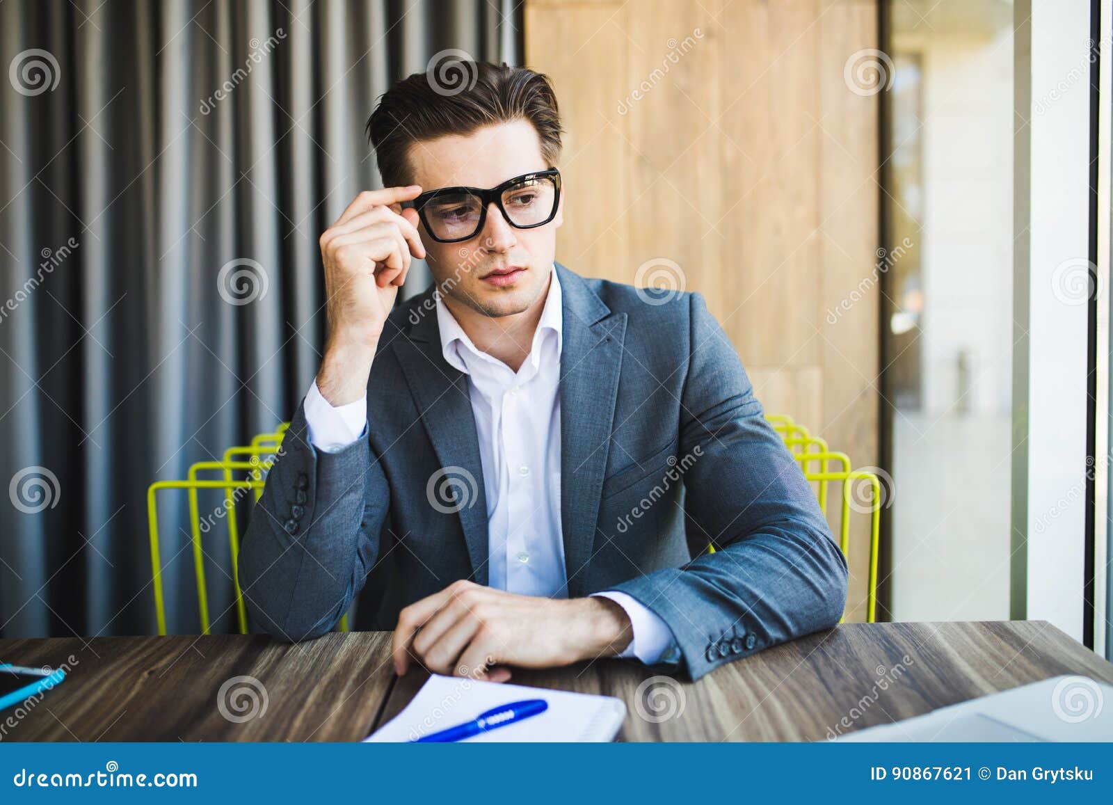 Portrait of Young Minded Man Thinking about Task in Office Stock Image ...