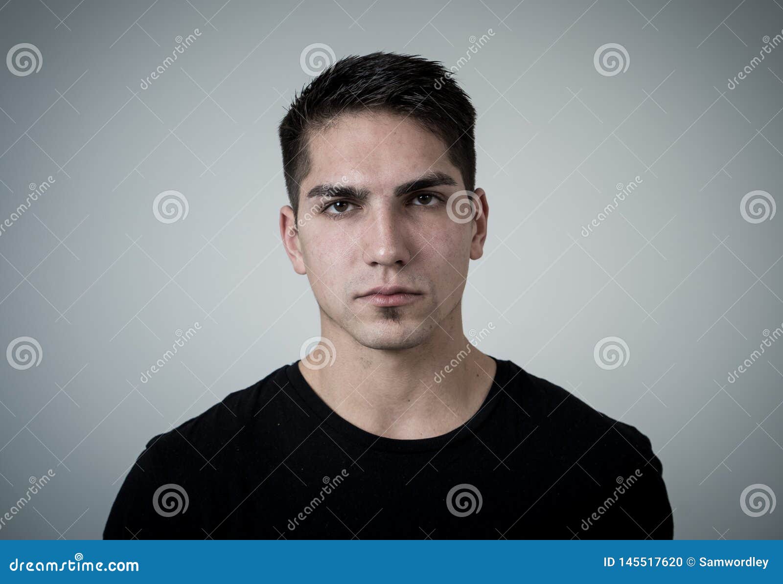 Portrait Of A Young Mixed Race Man With Angry Face Looking Furious