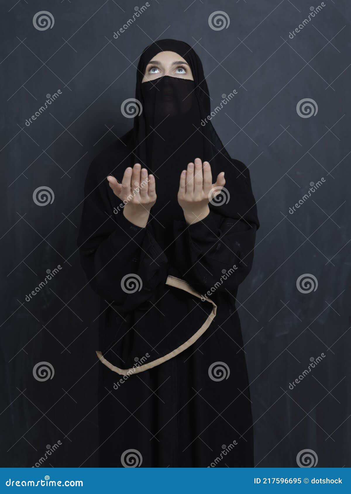 Portrait Of Young Muslim Woman With Niqab Making Dua Stock Image