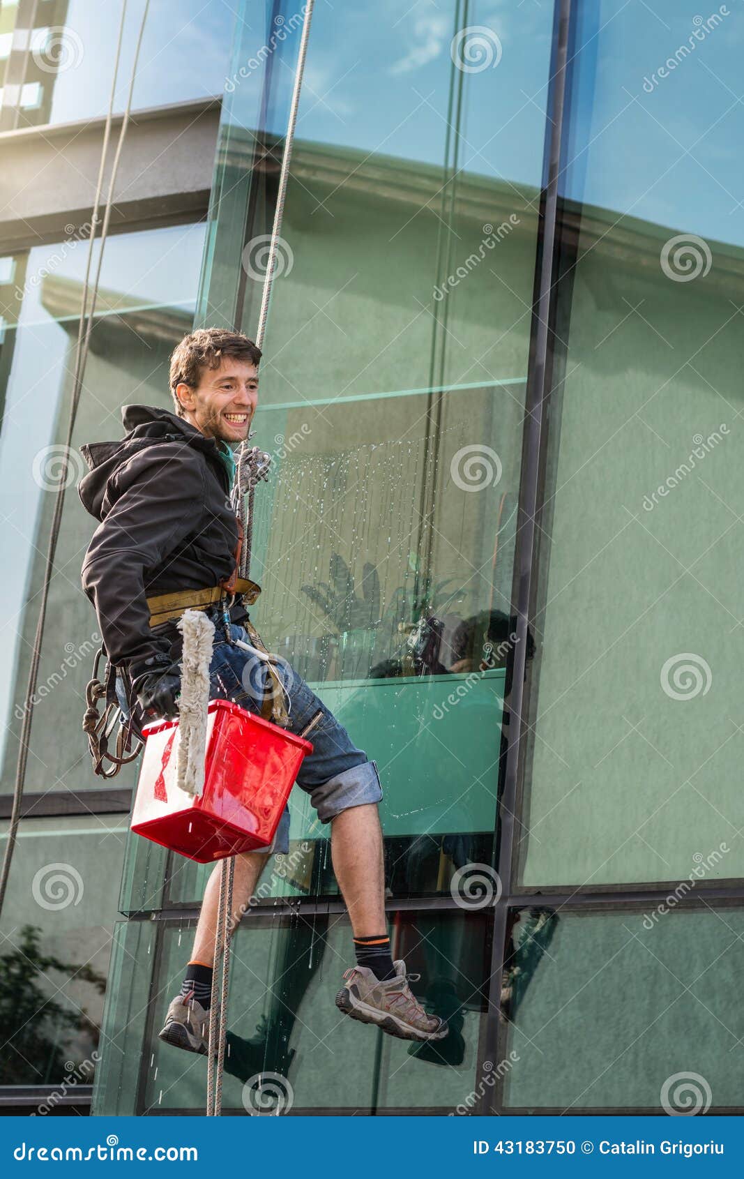 Portrait of Young Person Washing Windows Stock Photo - Image of harness ...