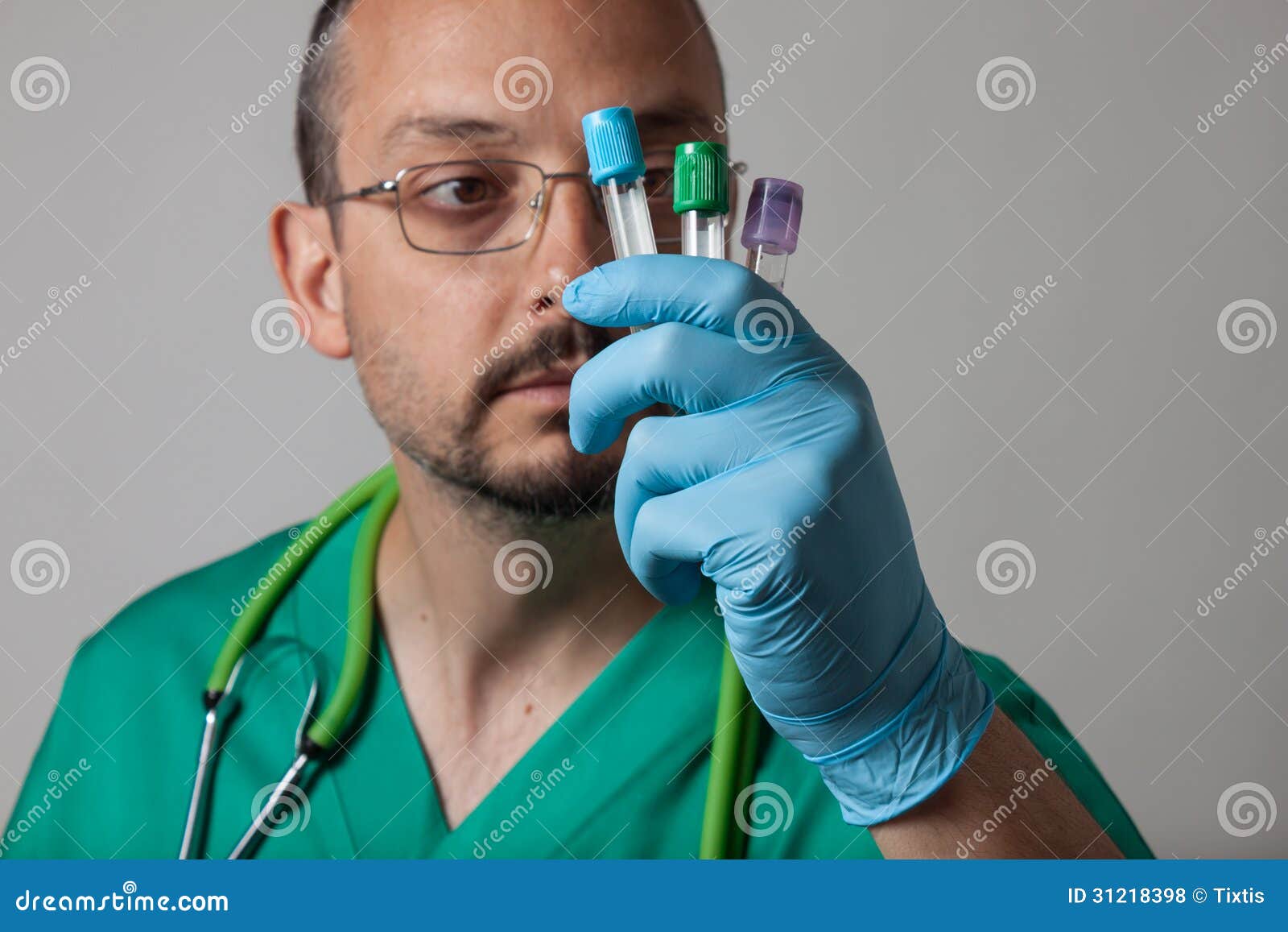 Portrait of a Young Physician Looking at Test Tubes Stock Photo - Image ...
