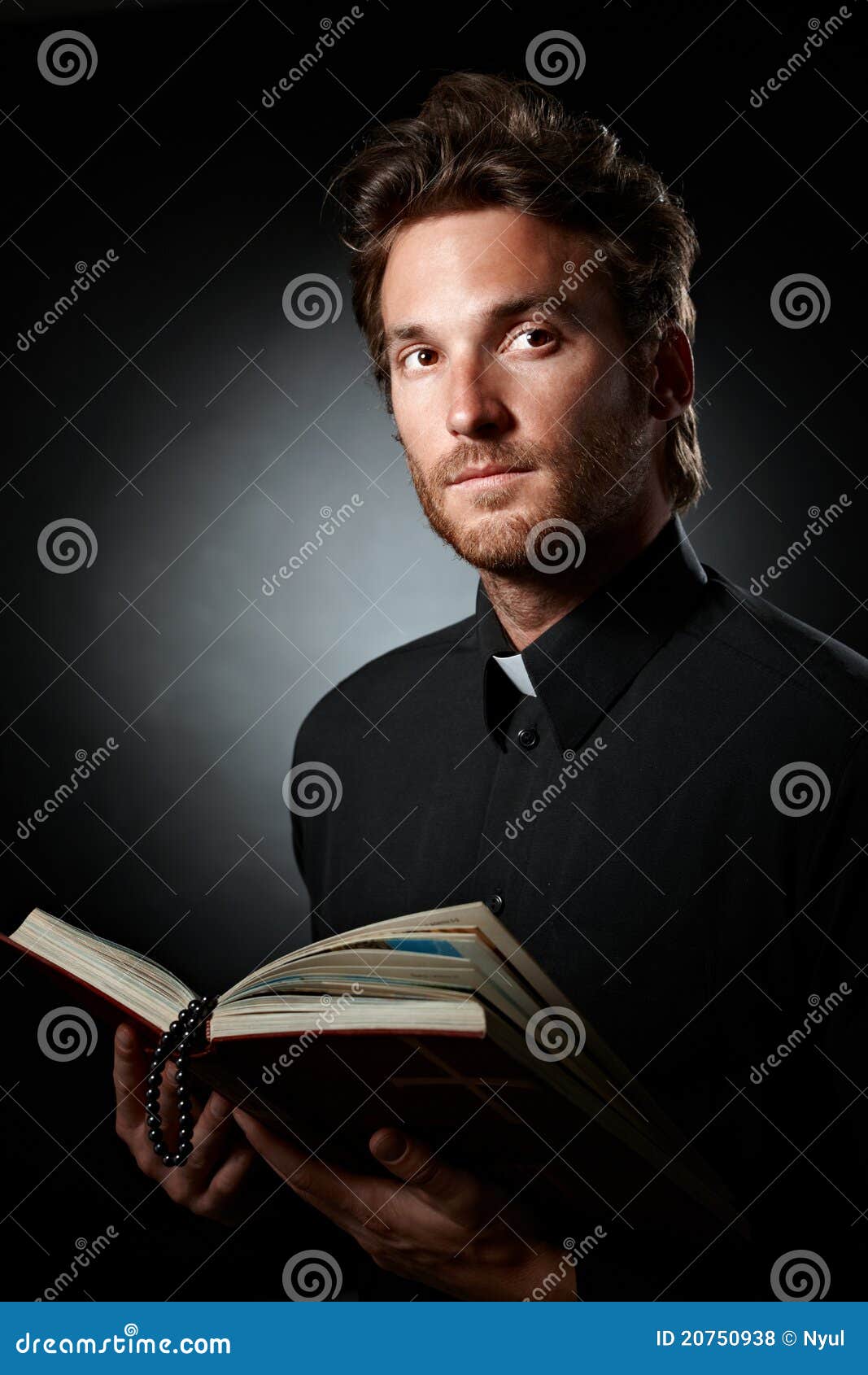 Portrait of Young Priest with Bible. Stock Photo - Image of person ...