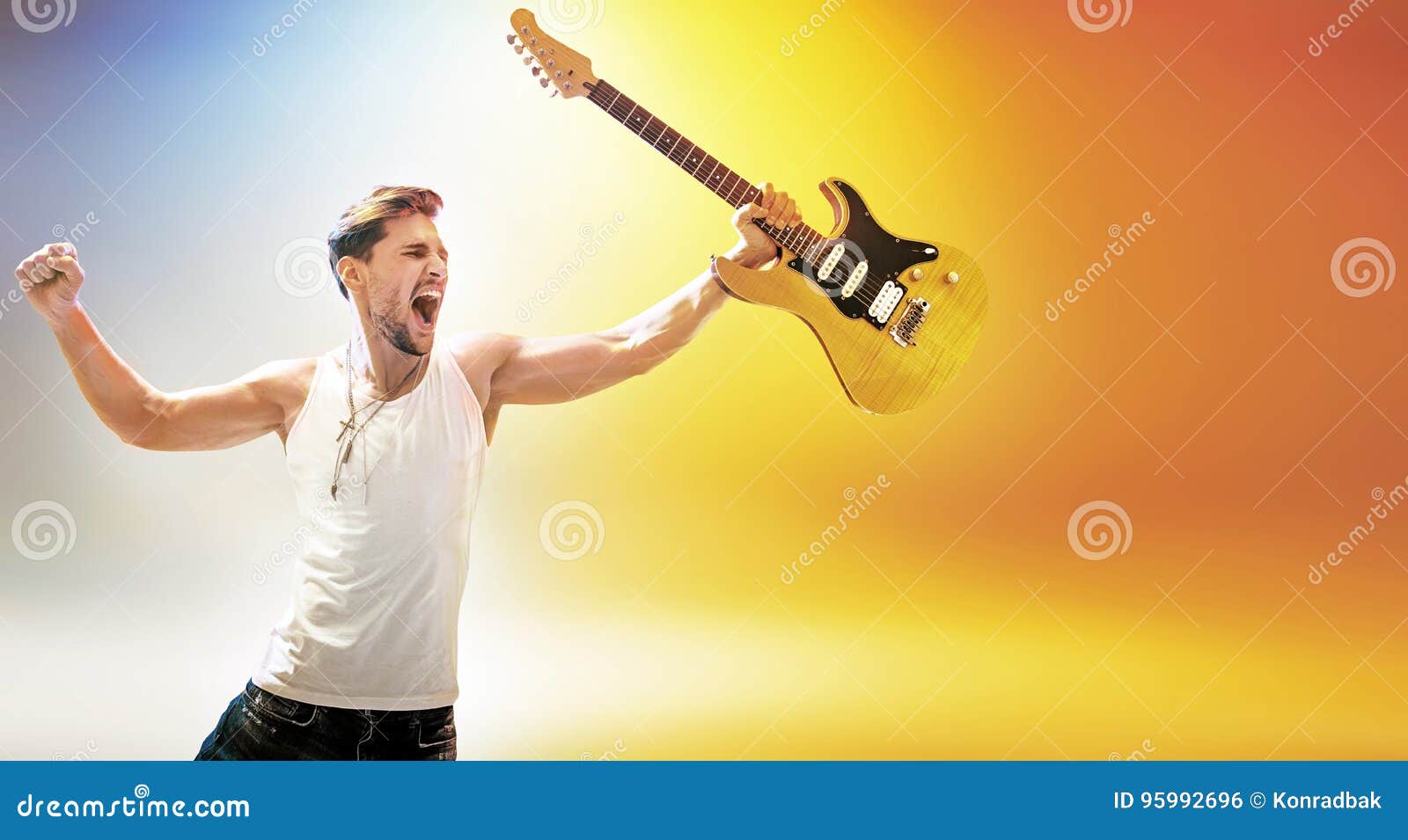 Portrait of the Young Rock Star Holding a Guitar Stock Photo - Image of ...