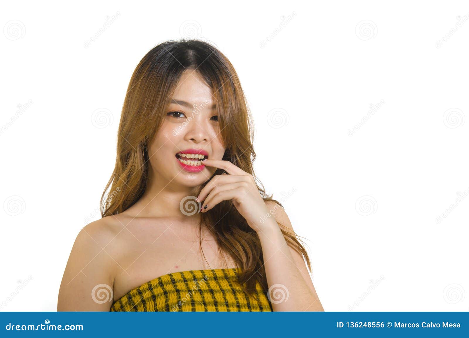 Portrait Of Young And Playful Asian Woman Posing Fresh And Naughty In