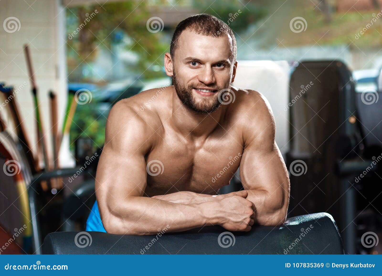 Cheerful Bodybuilder Resting Stock Image - Image of cross, model: 107835369