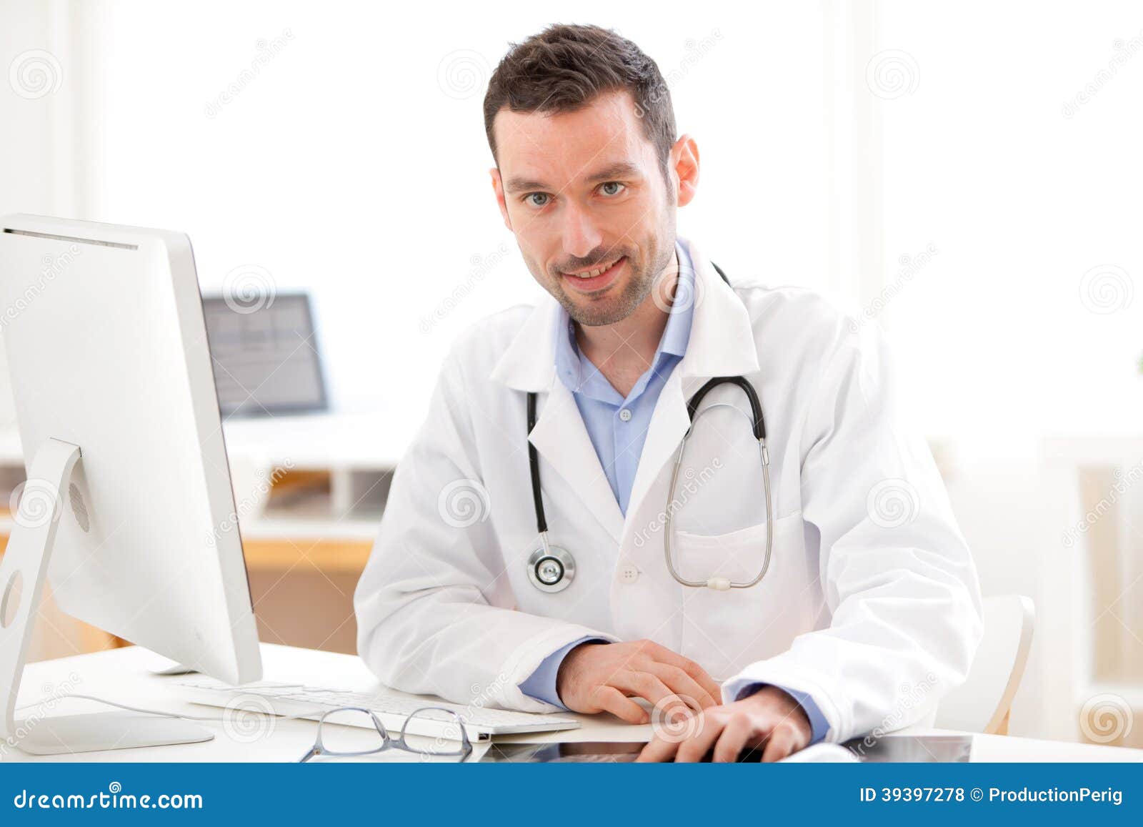 Portrait of a Young Smiling Doctor in His Office Stock Photo - Image of ...
