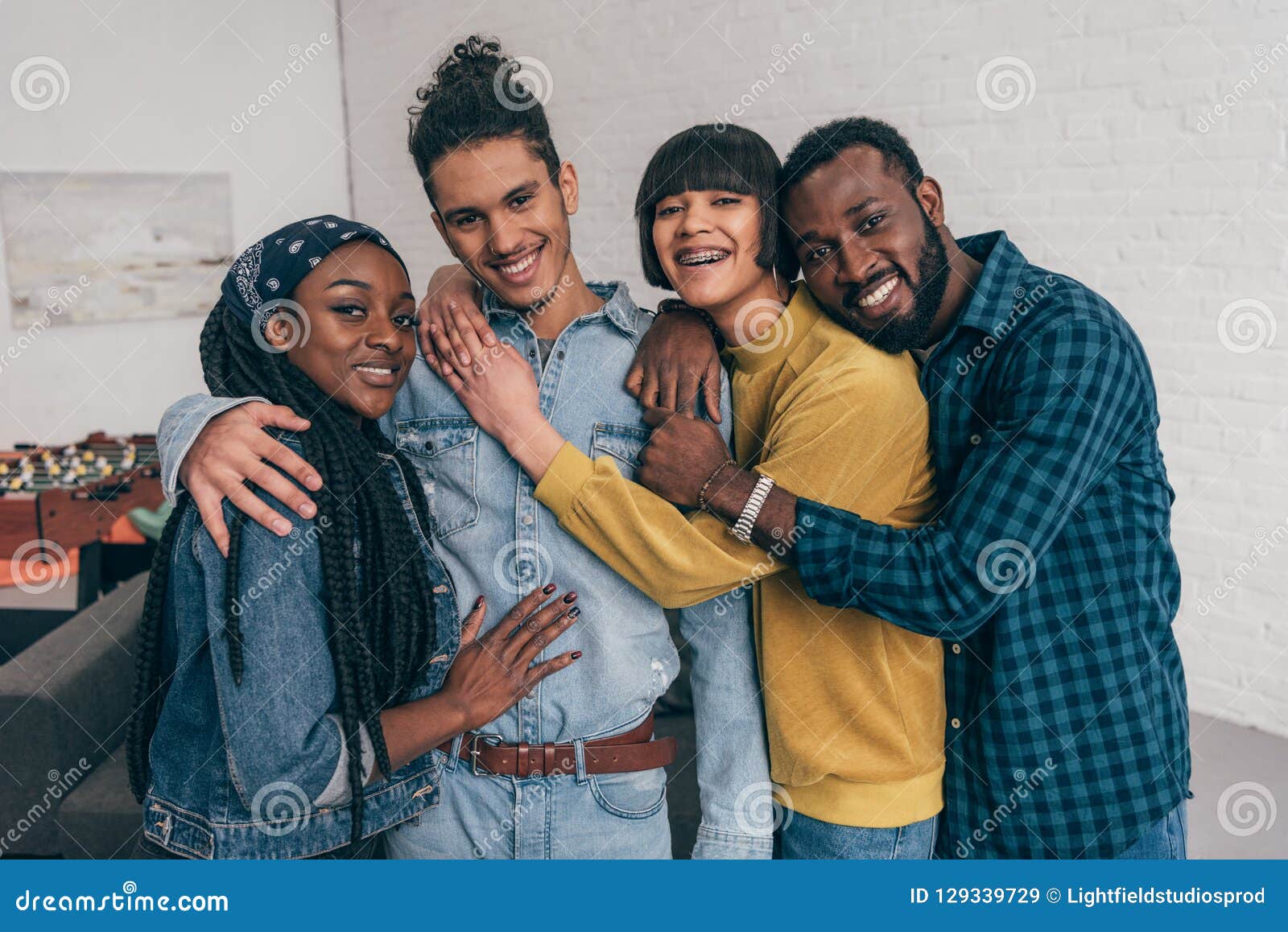 Portrait of Young Smiling Group of Multiethnic Friends Embracing Stock ... Portrait of Young Smiling Group of Multiethnic Friends Embracing Stock ...