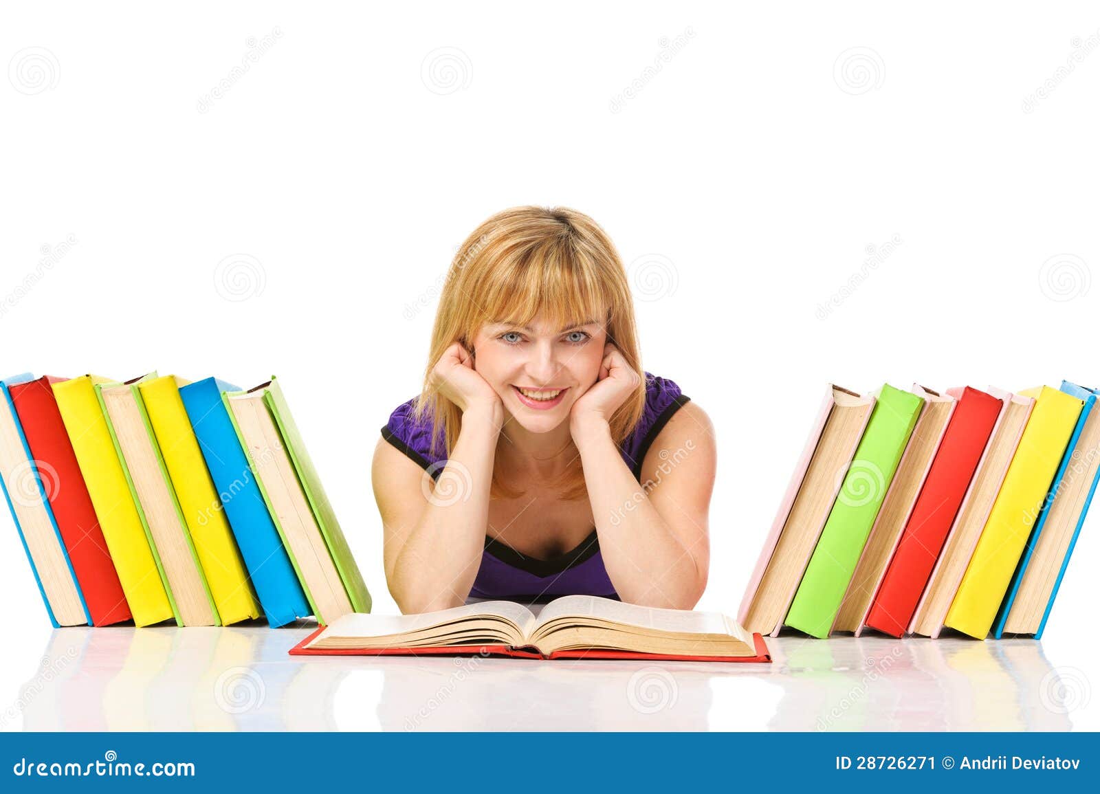 Portrait of a Young Student Reading a Book Lying on a Floor Stock Image ...