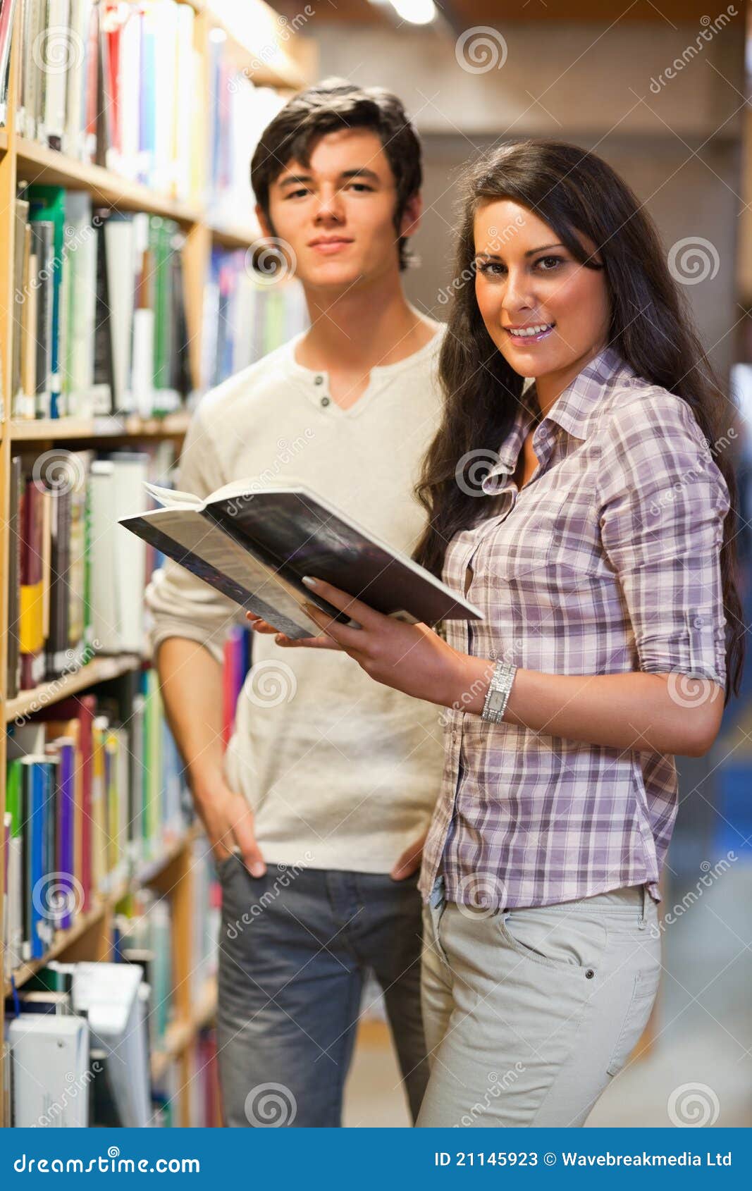 Portrait of Young Students Holding a Book Stock Image - Image of campus ...