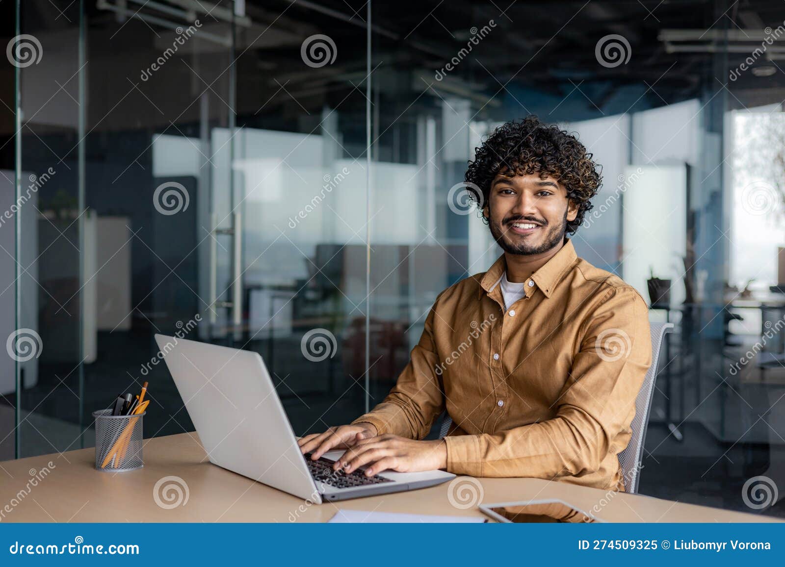 Portrait of Young Successful Indian Man at Workplace Inside Office ...