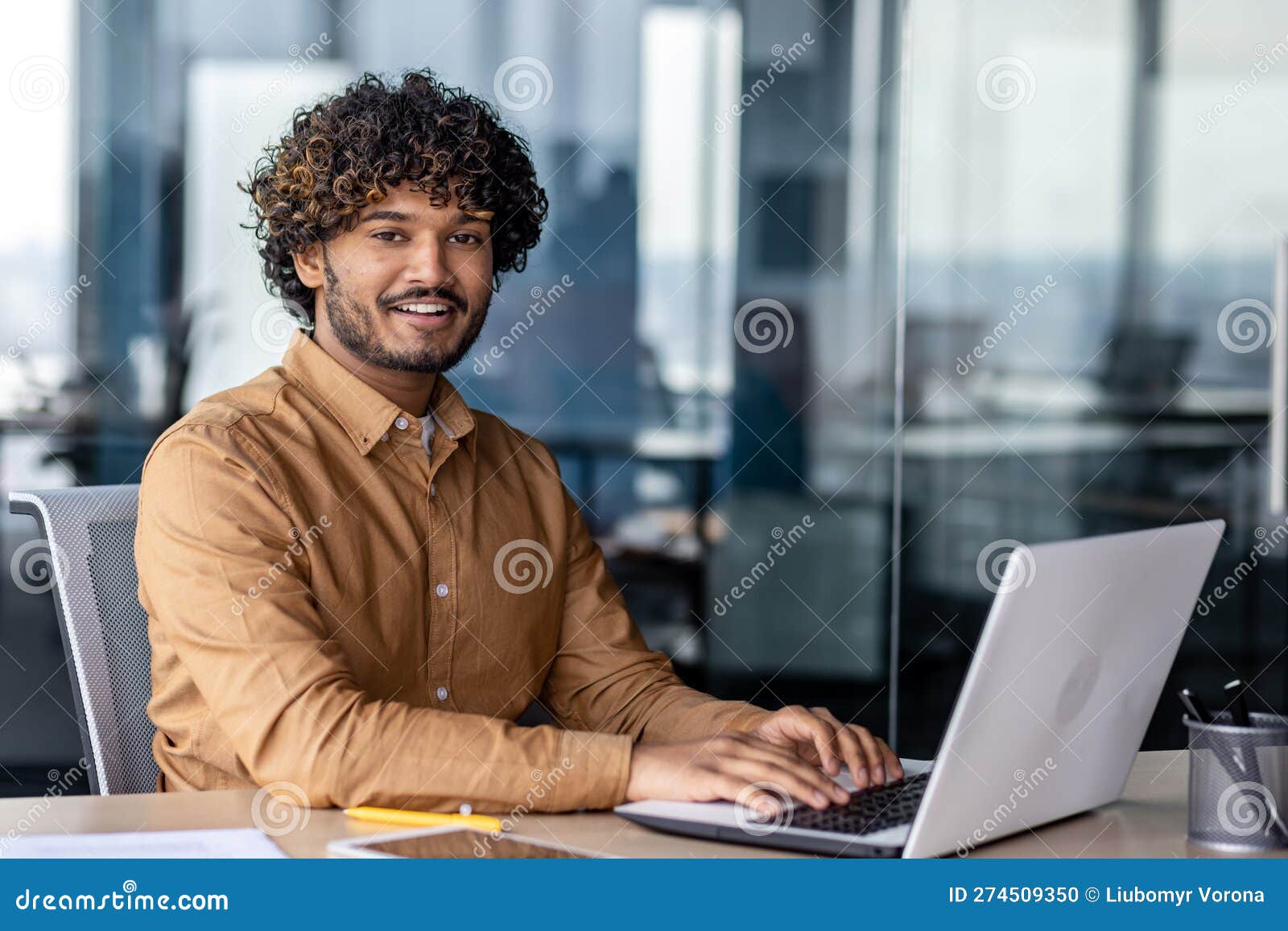 Portrait of Young Successful Indian Man at Workplace Inside Office ...