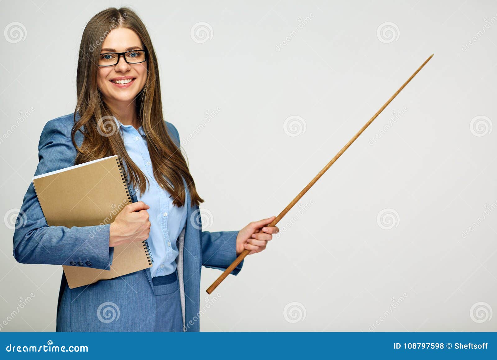 Portrait of Young Teacher Holding Pointer with Books. Stock Photo ... Portrait of Young Teacher Holding Pointer with Books. Stock Photo ...