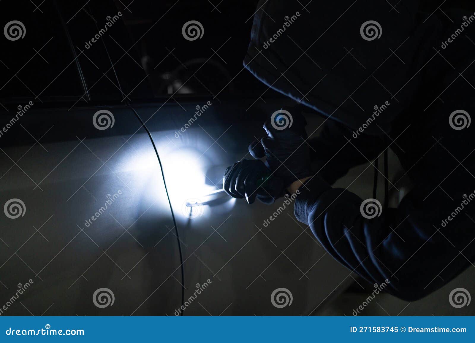 Portrait of a Young Thief Dressed in Black Stealing a Car at Night ...