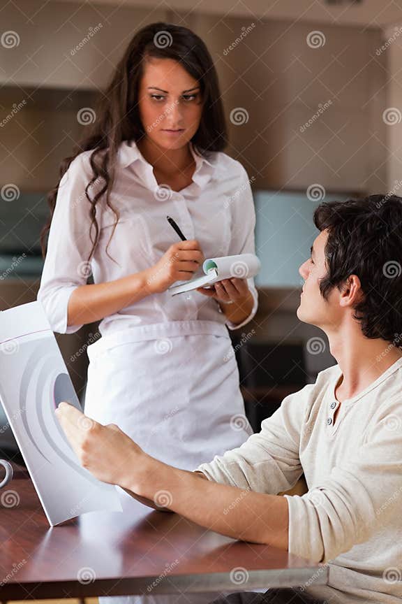 Portrait of a Young Waitress Taking an Order Stock Photo - Image of ...