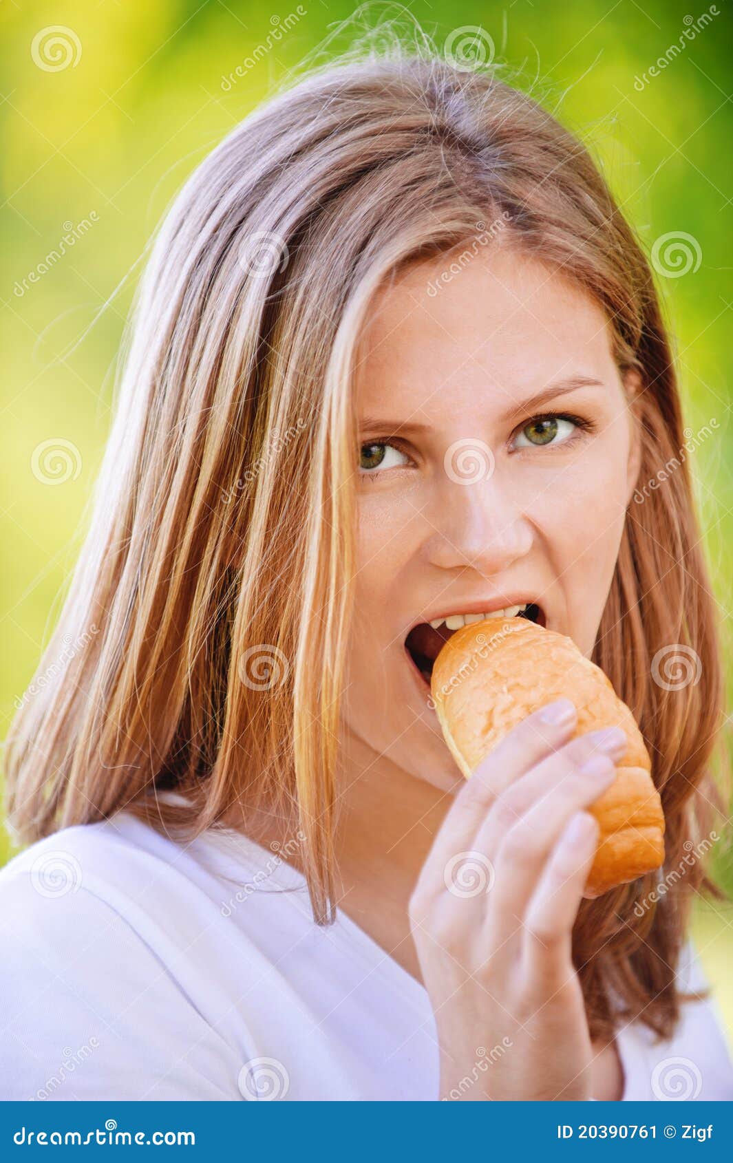 Portrait of Young Woman Eating Bun Stock Image - Image of adult, look ...