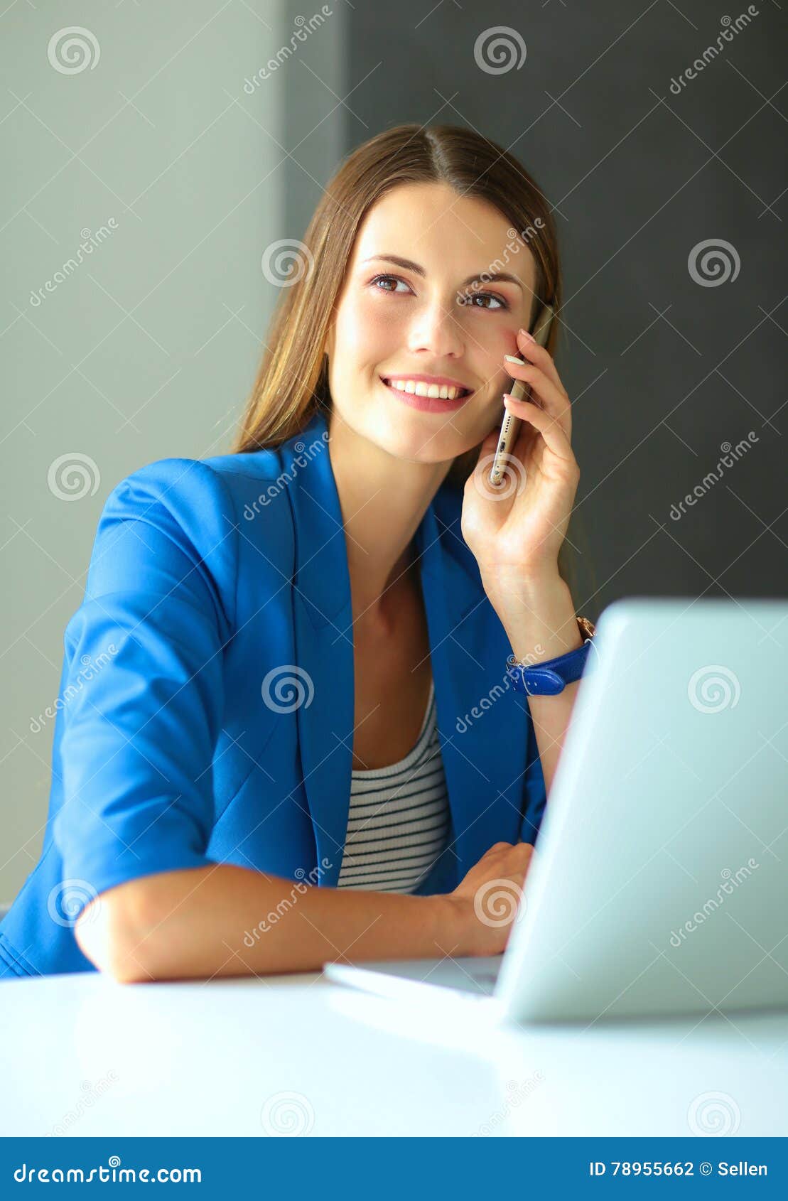 Portrait Young Woman on Phone in Front of a Laptop Computer Stock Photo ...