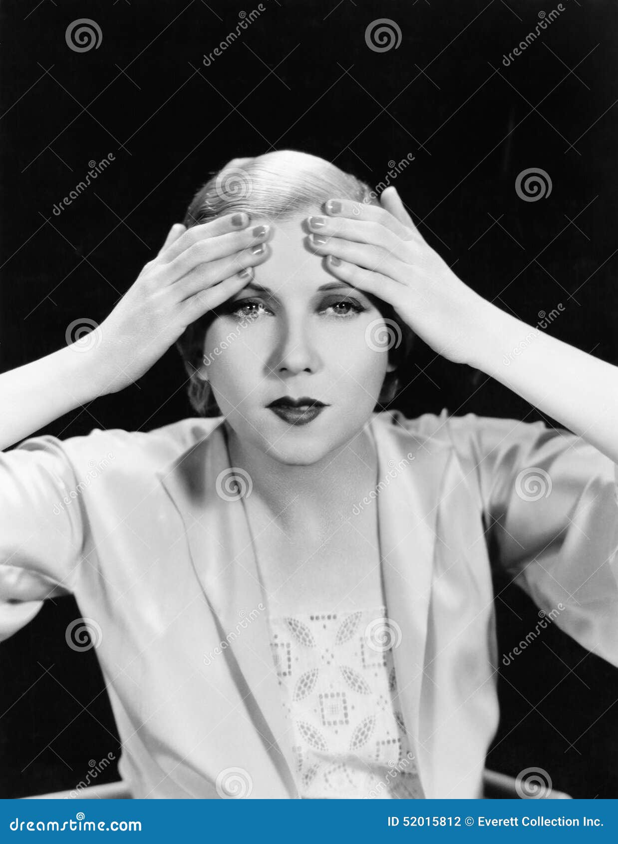 Portrait of a Young Woman Putting Both Hand on Her Forehead Stock Photo ...