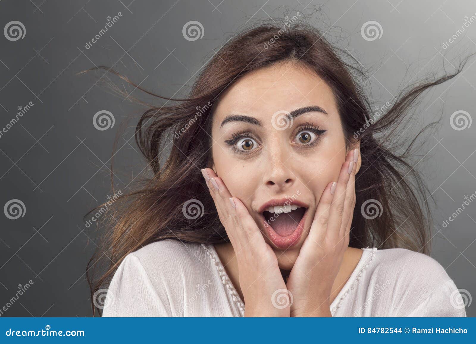 Portrait of Young Woman with Shocked Facial Expression Stock Photo ... Portrait of Young Woman with Shocked Facial Expression Stock Photo ...