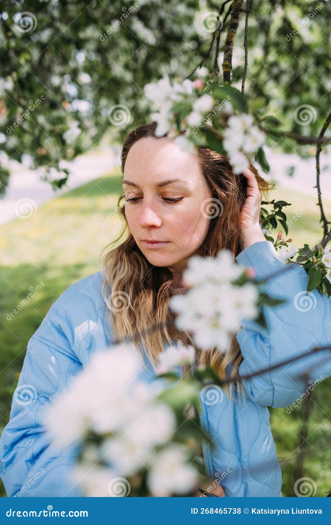 Portrait of a Young Woman in Spring in a Park Stock Photo - Image of ...