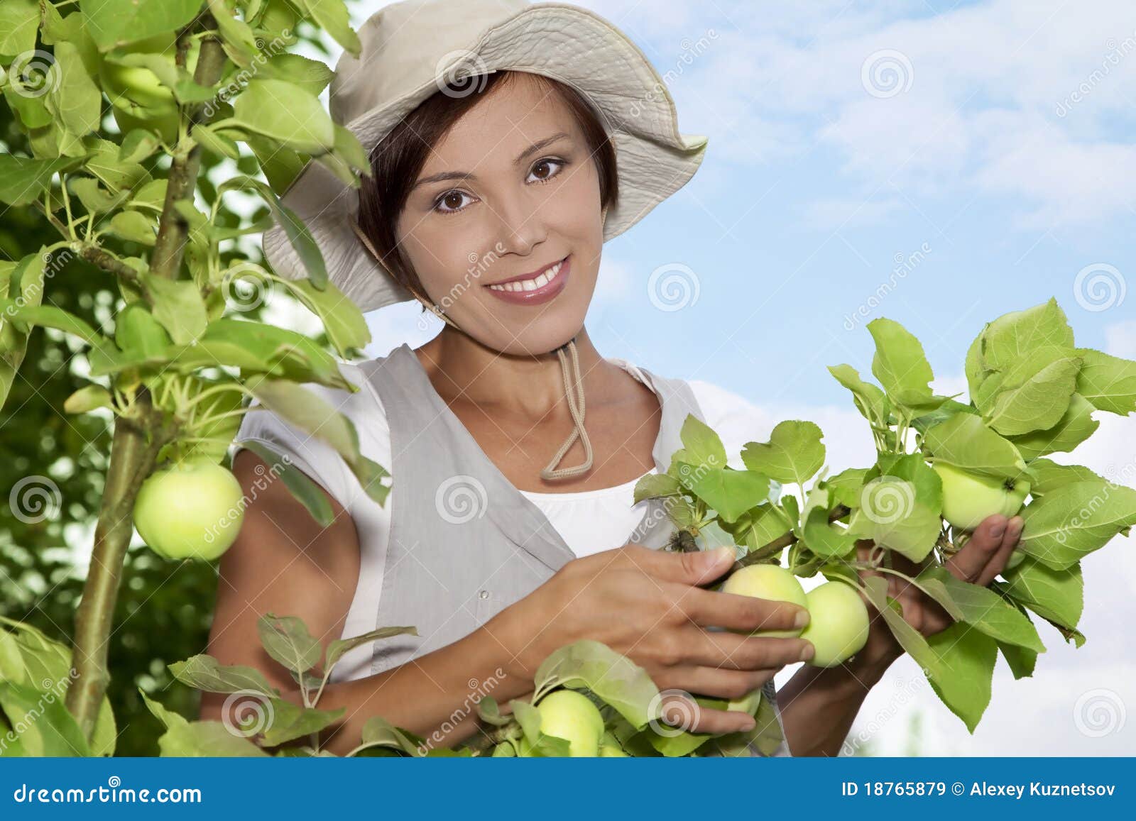 Portrait of Young Woman Standing at Apple Tree Stock Image - Image of ...