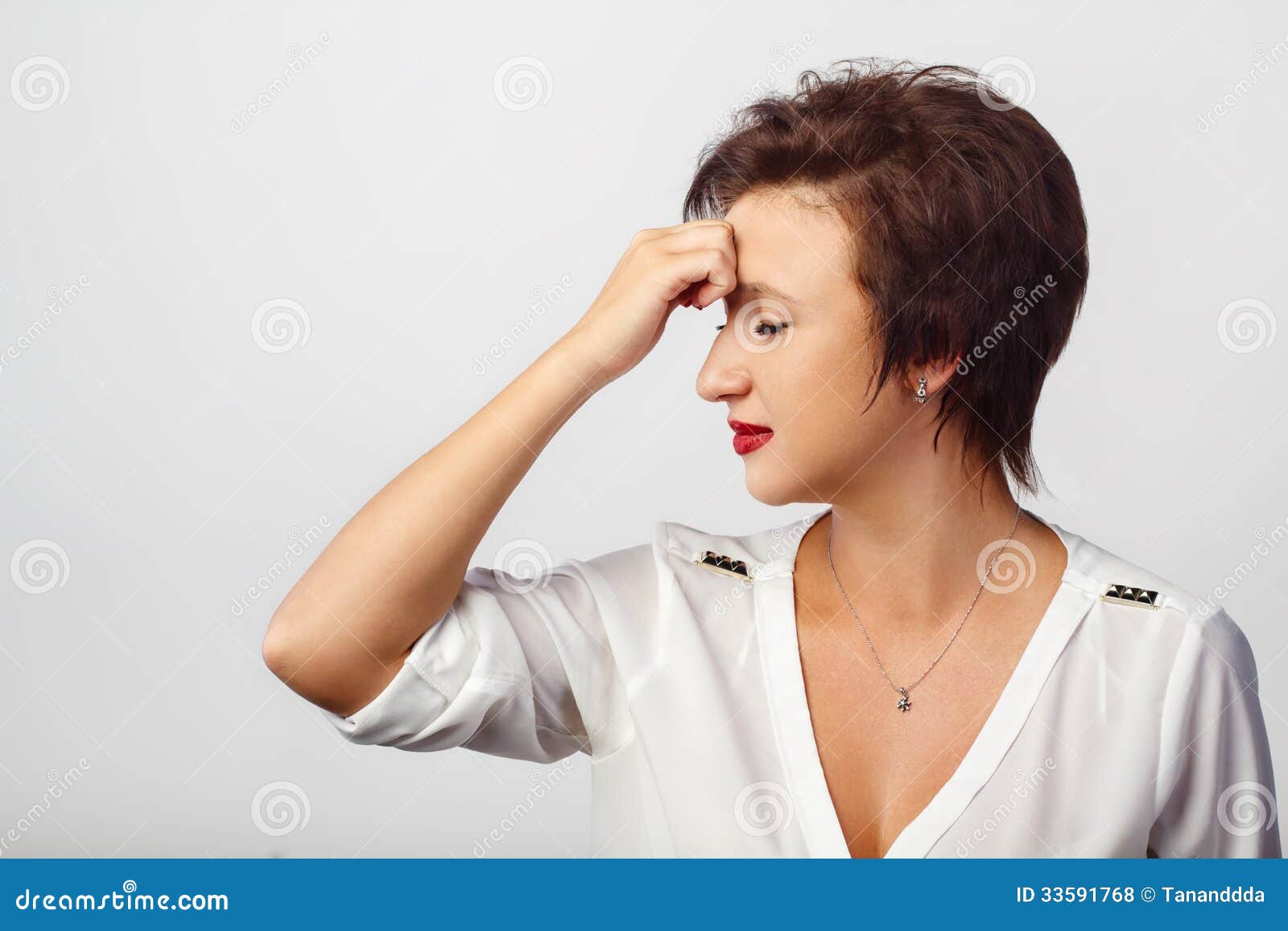 A Portrait of Young Woman Touching Her Forehead Stock Photo - Image of ...