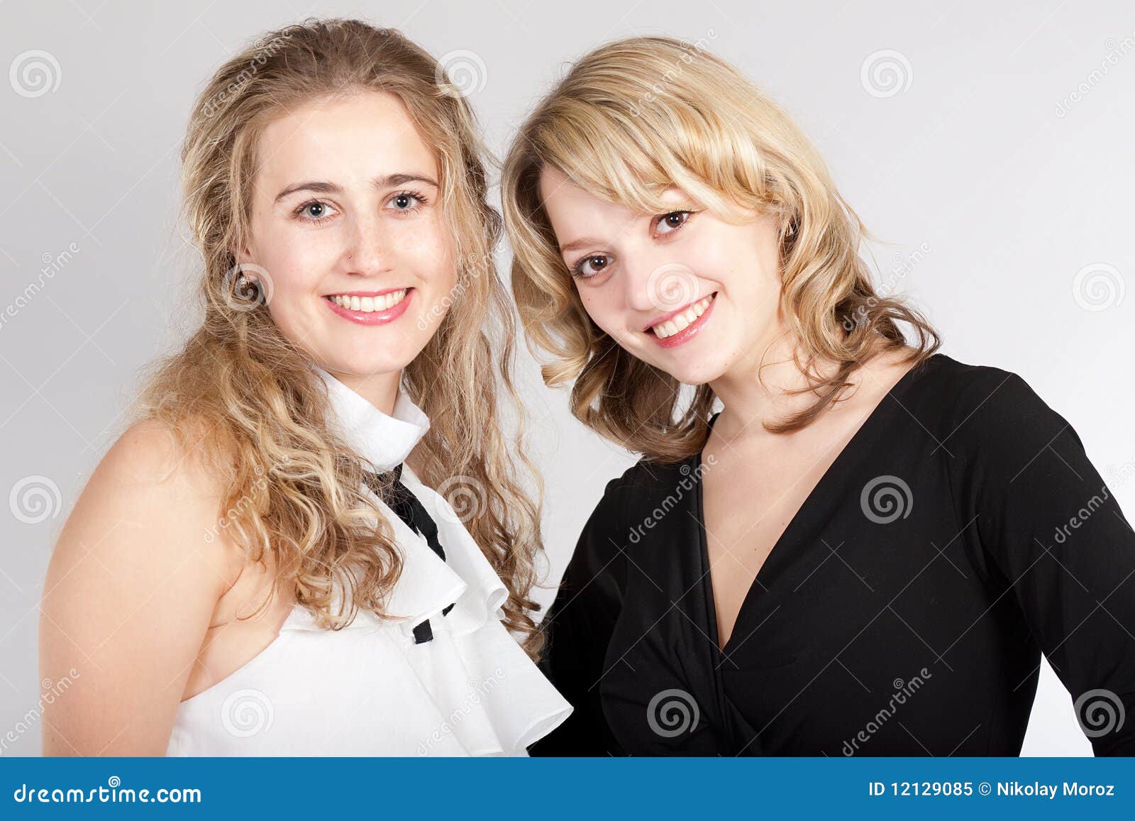 Portraits of Two Beautiful Girls Stock Image - Image of girl, black ...