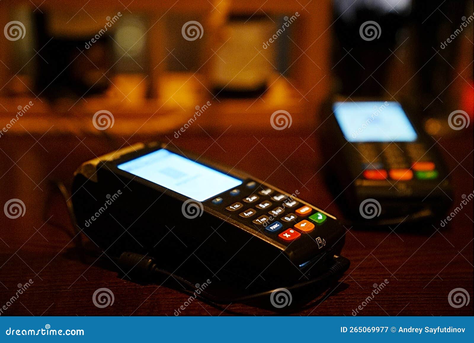 A POS Terminal on a Table in a Dark Room. Stock Image - Image of ...