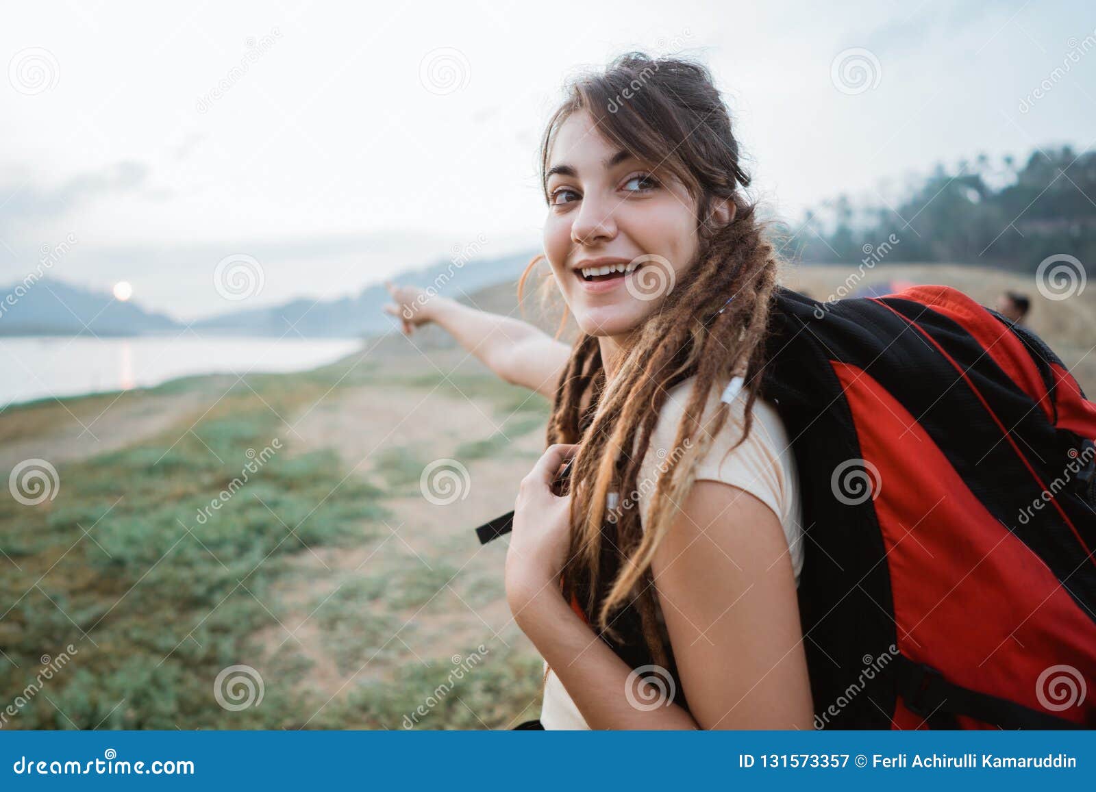 Pose Caucasian Woman with Backpack Looking Back for Camera Stock Image ...
