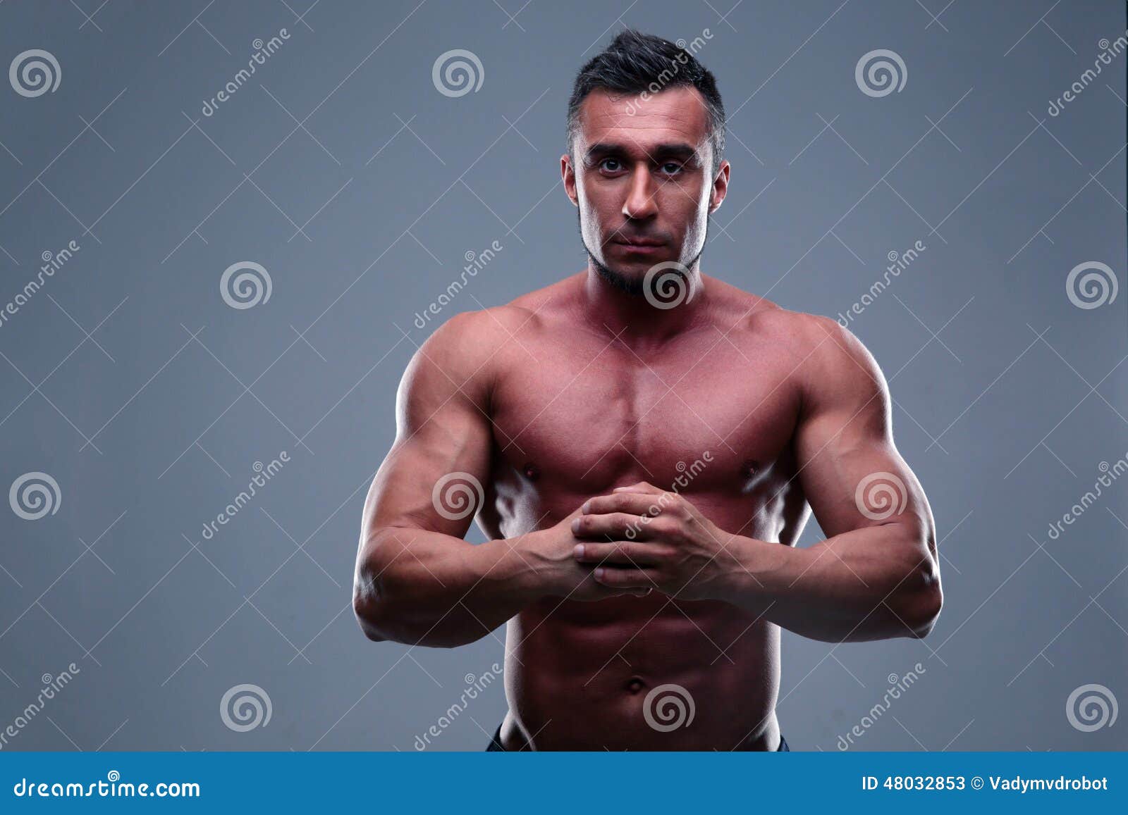 Position Musculaire D'homme Image stock - Image du musculaire, mains ...