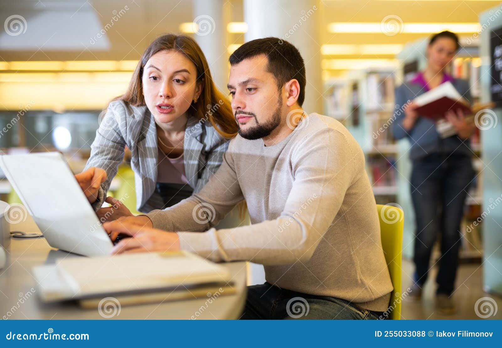 Positive Adults Communicating while Preparing To Exam in Library Stock ...