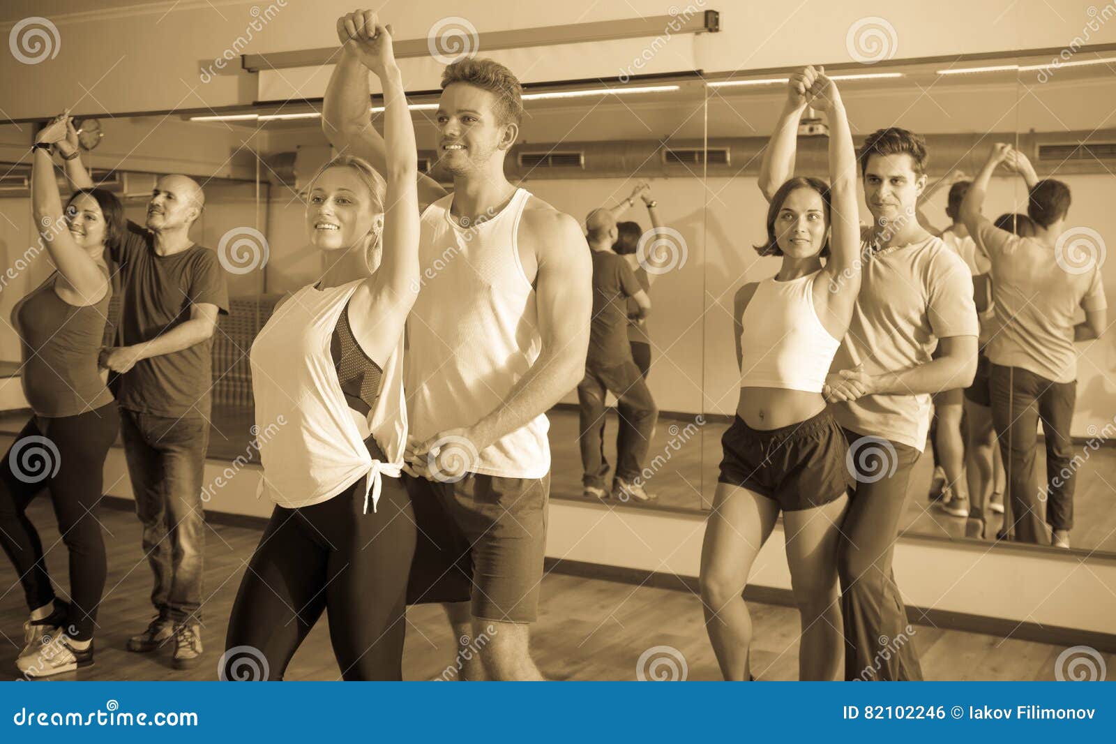 Positive Adults Dancing Bachata Together Stock Photo - Image of ...