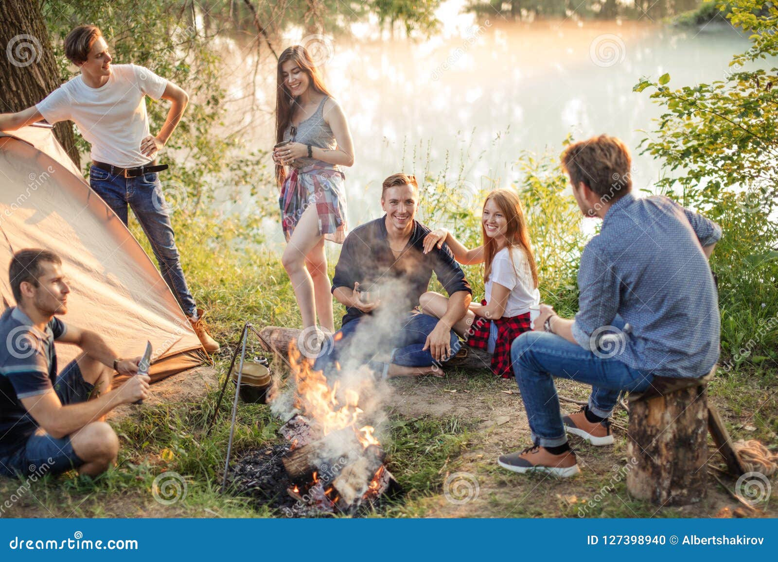 Positive Adventurous People are Waiting for the Preparation of Dinner ...